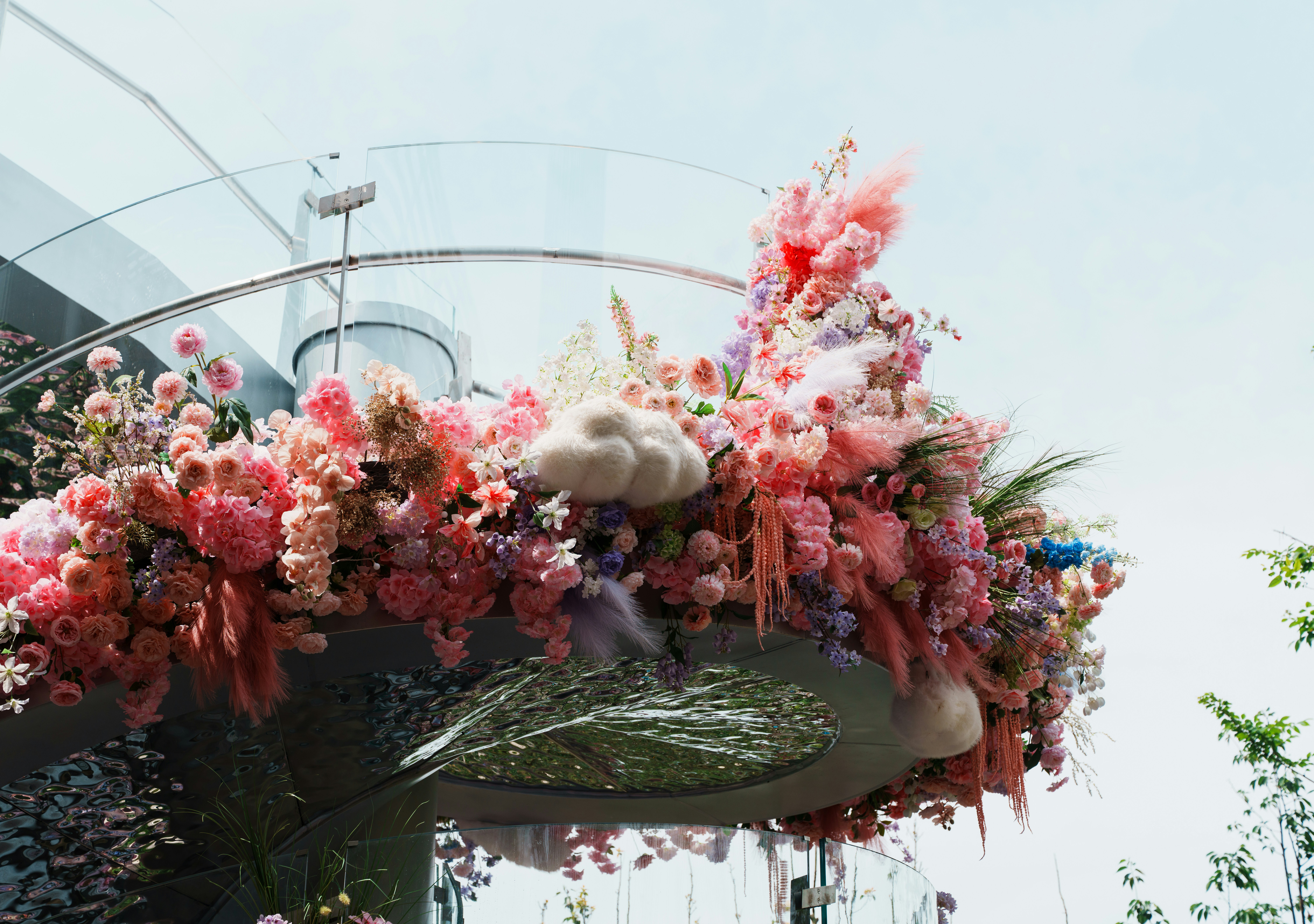 Floral Arc: A Balcony of Blooming Caricatures over Modern Architecture
