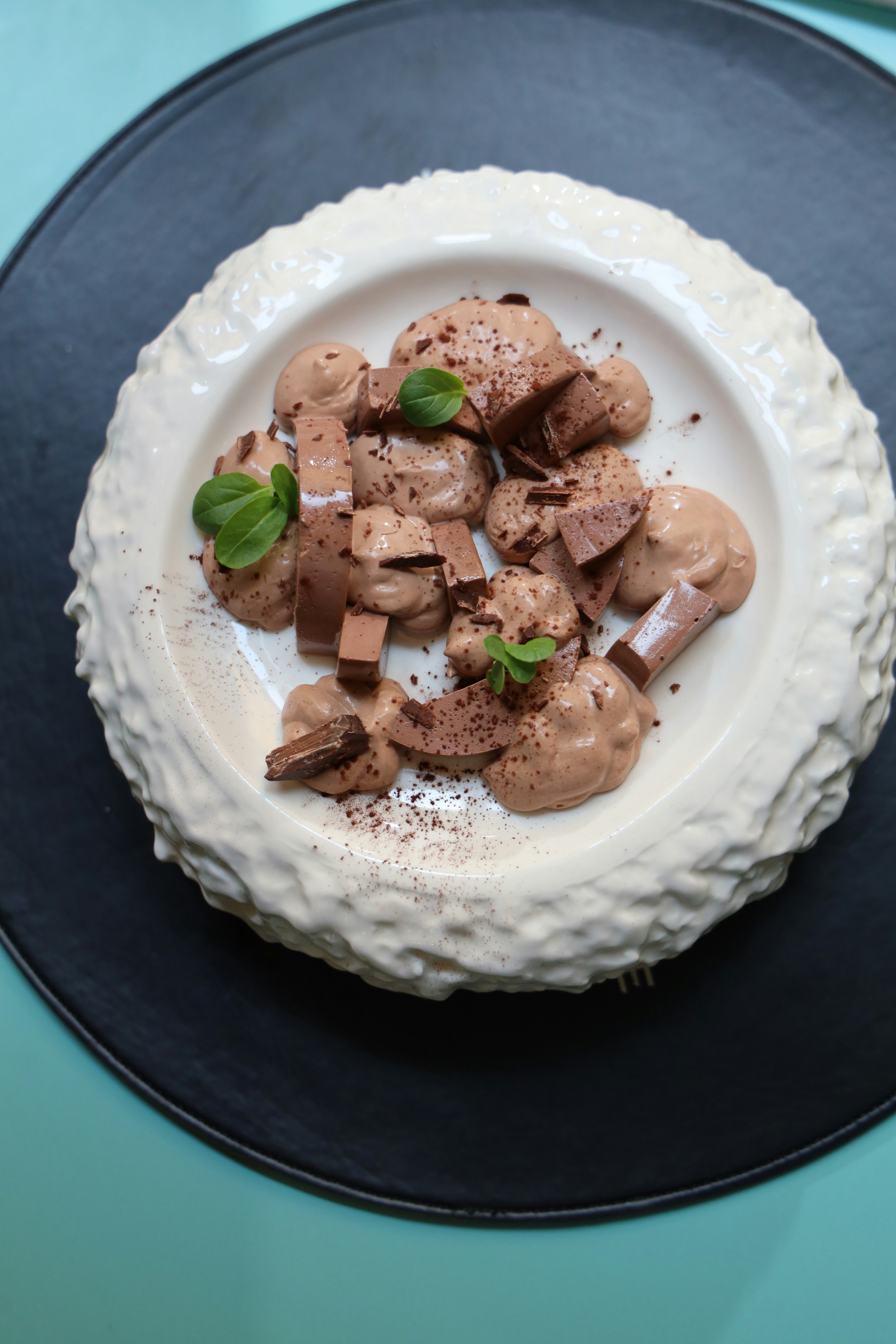 Chocolate Mosaic Dessert on a Textured White Plate