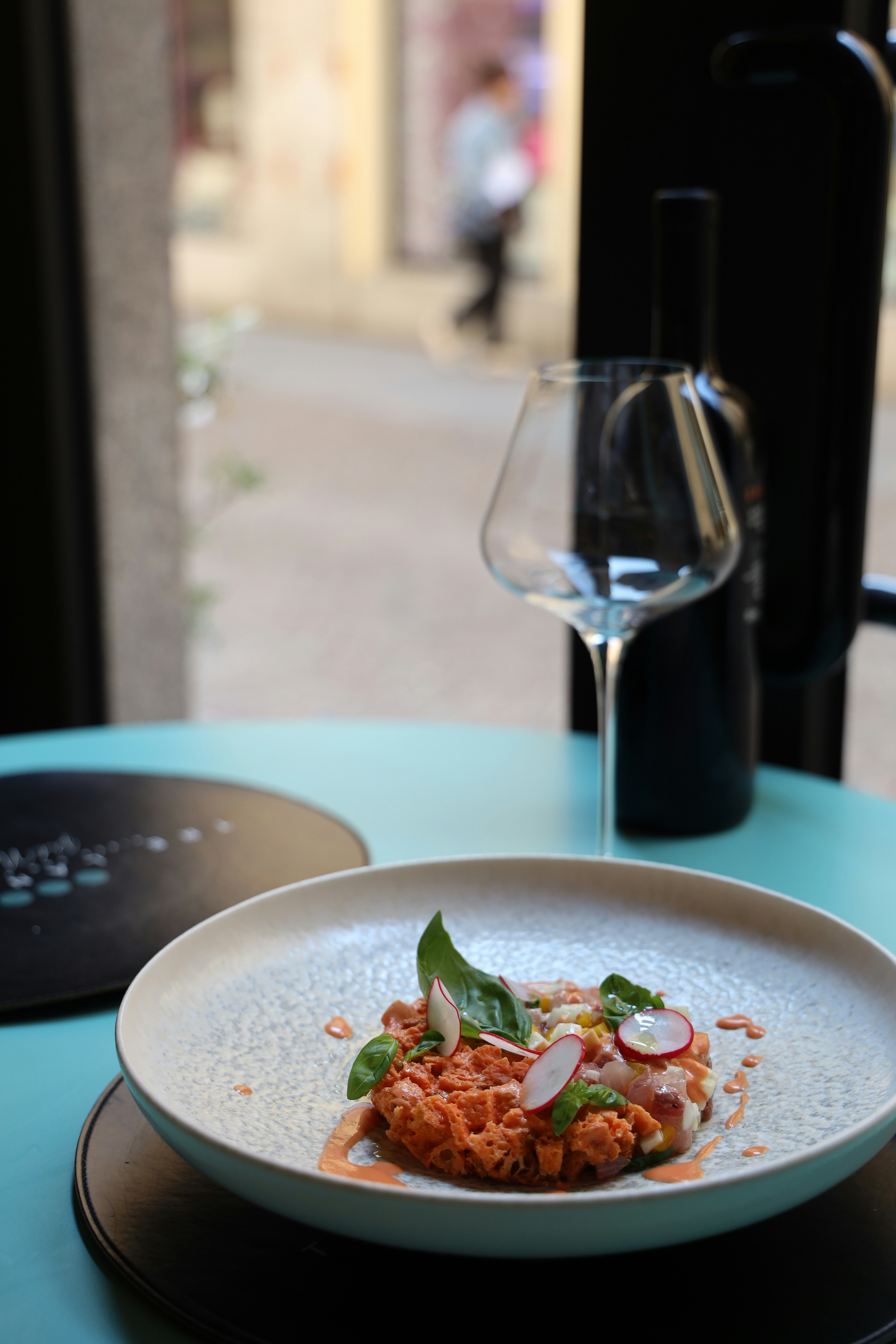 Crimson Plate: A Delicate Dish Under Soft Bistro Light