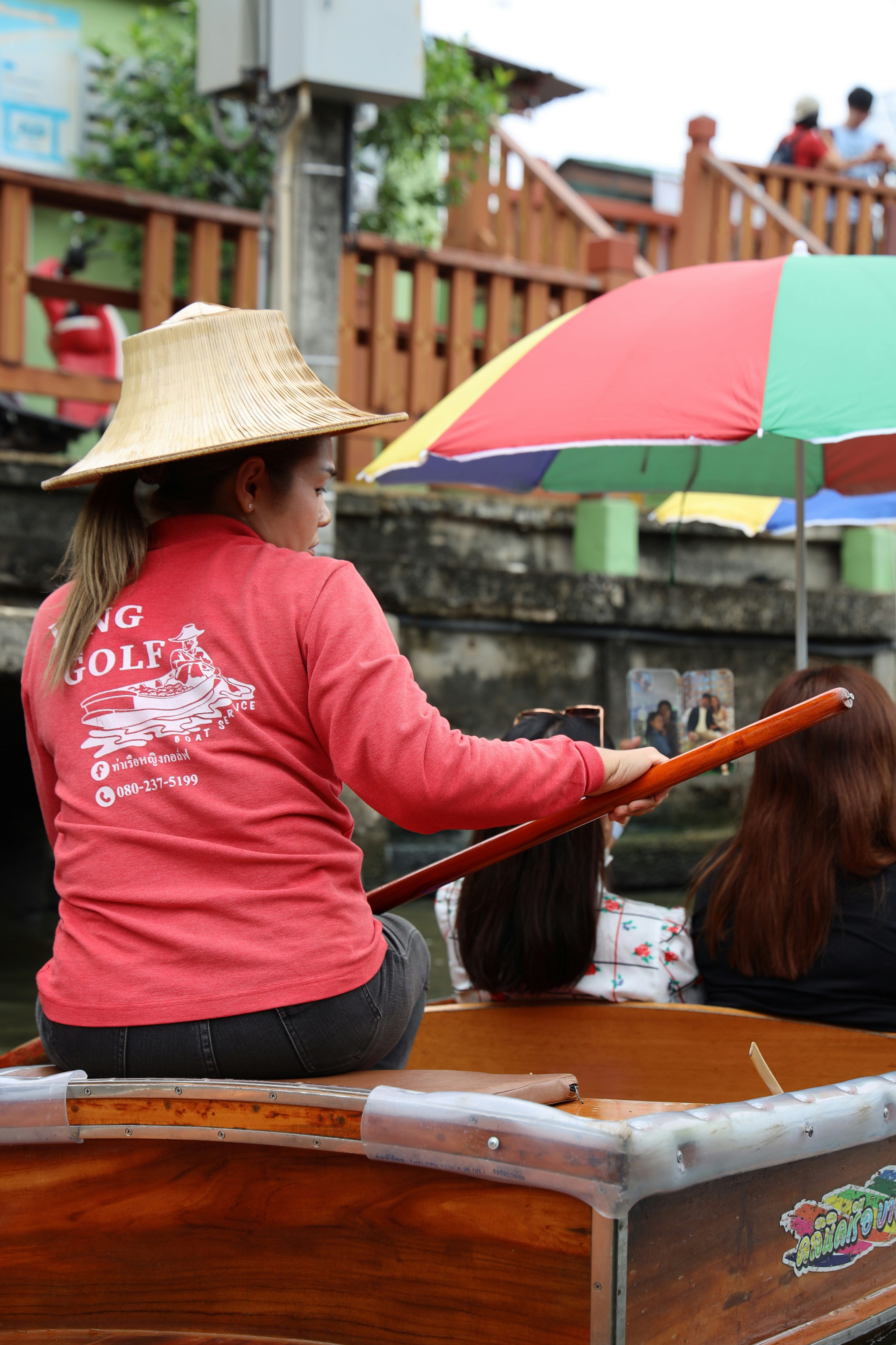 Red-Checked Rider: A Gondola of Colorful Moments on the Riverbank