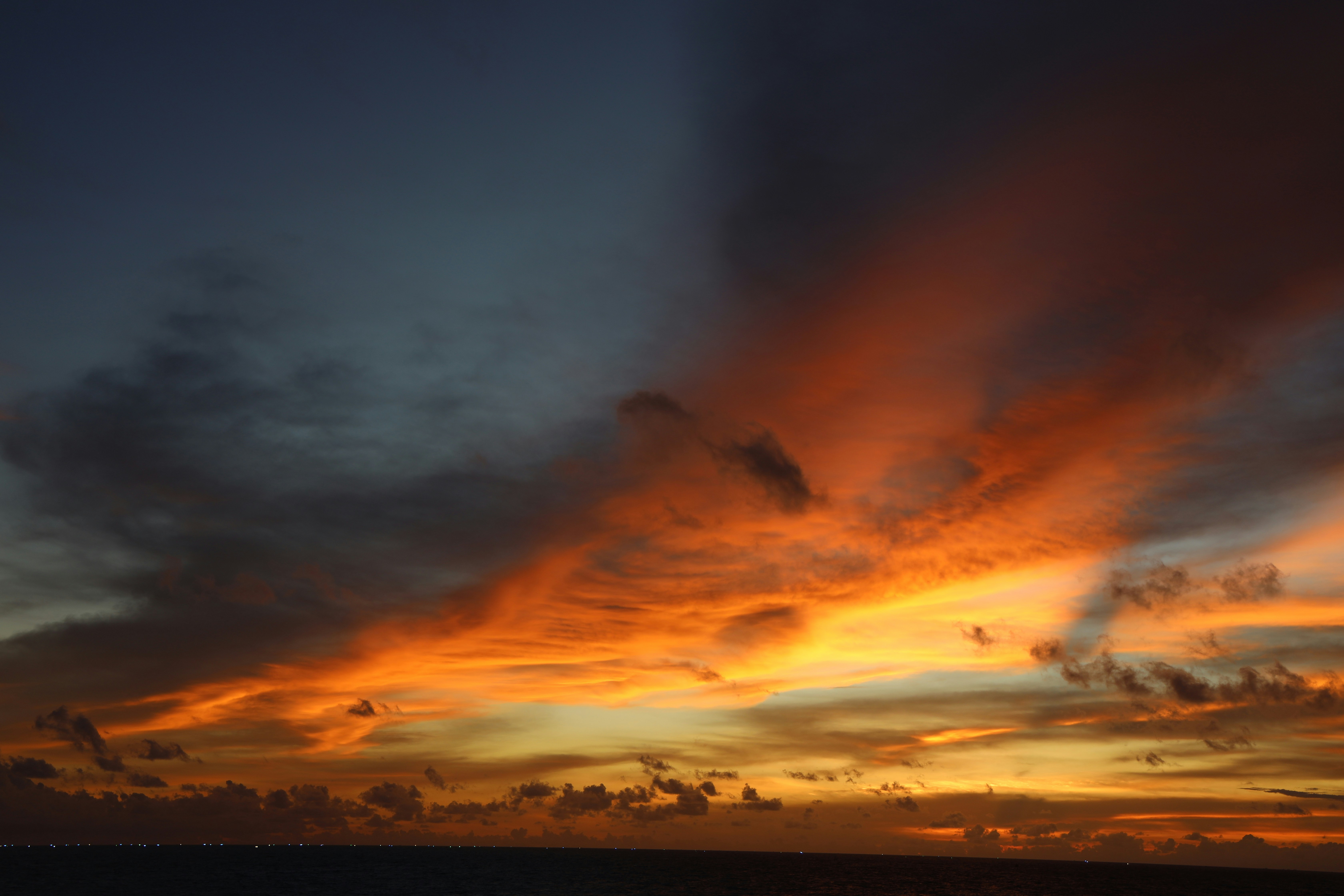 Embers on the Horizon: A Quiet Sea Sunset