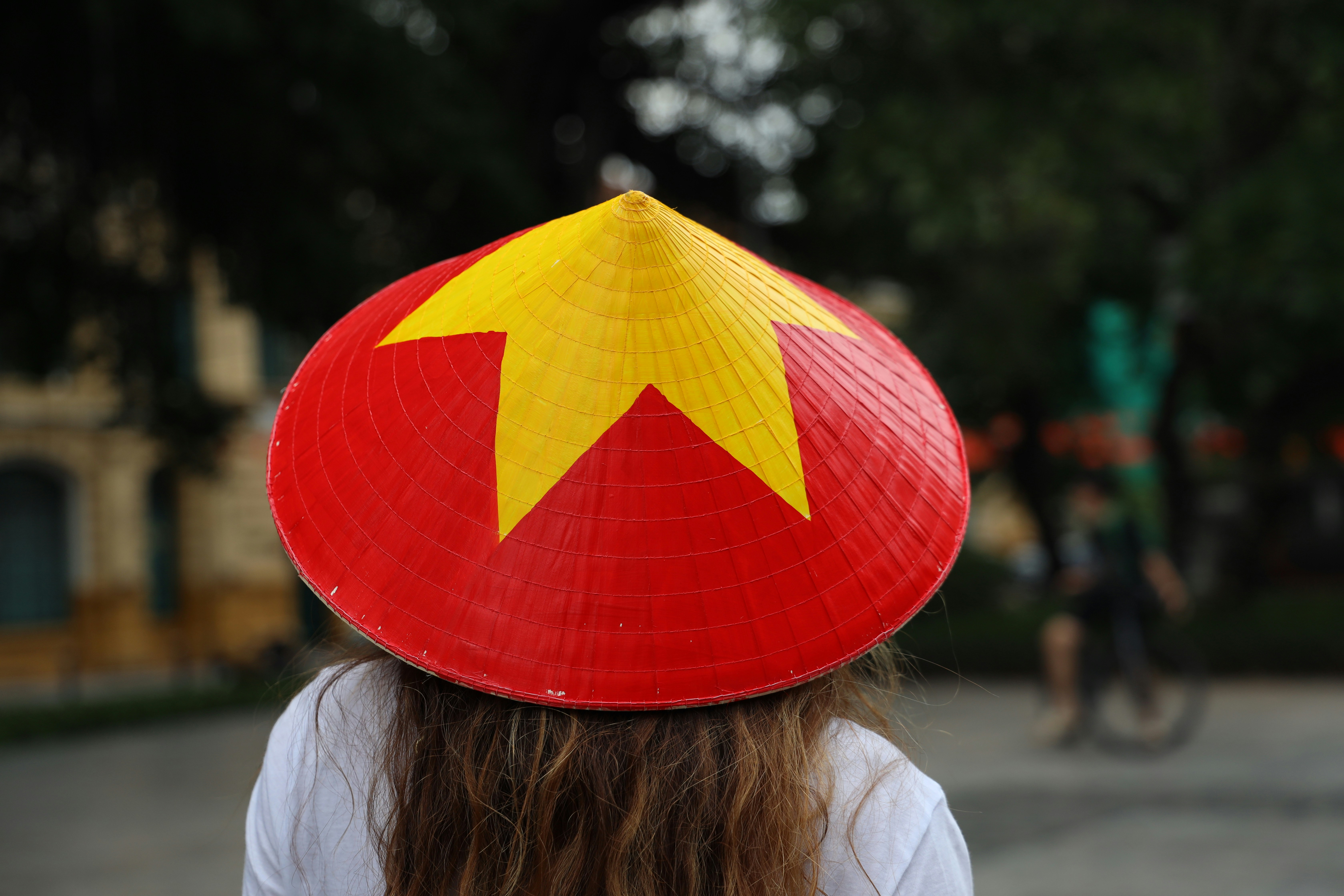 Red Star Hat: A Portrait of Color and Quiet Mystery