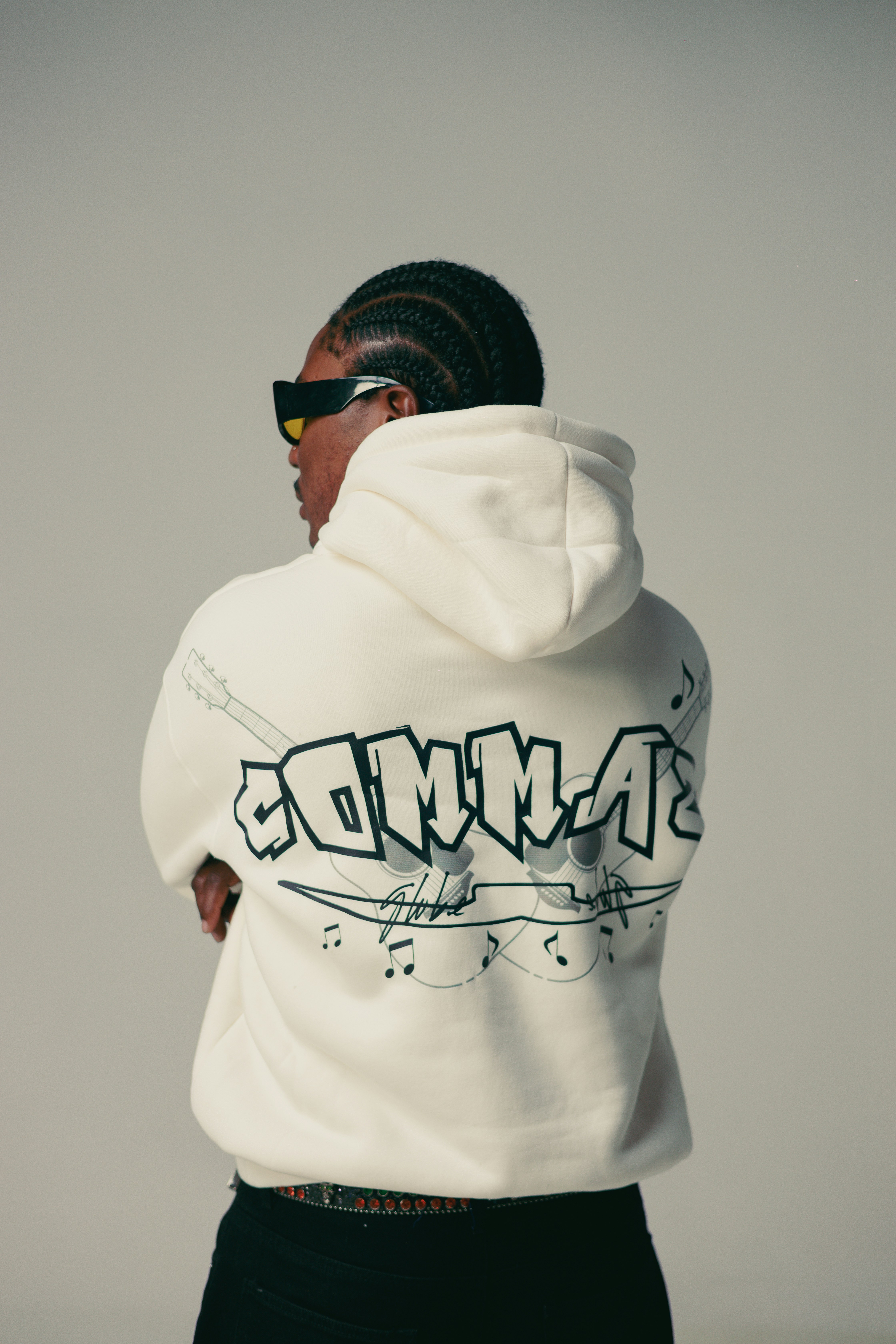 Backturned in Style: A Hoodie Portrait with Graphic Motion