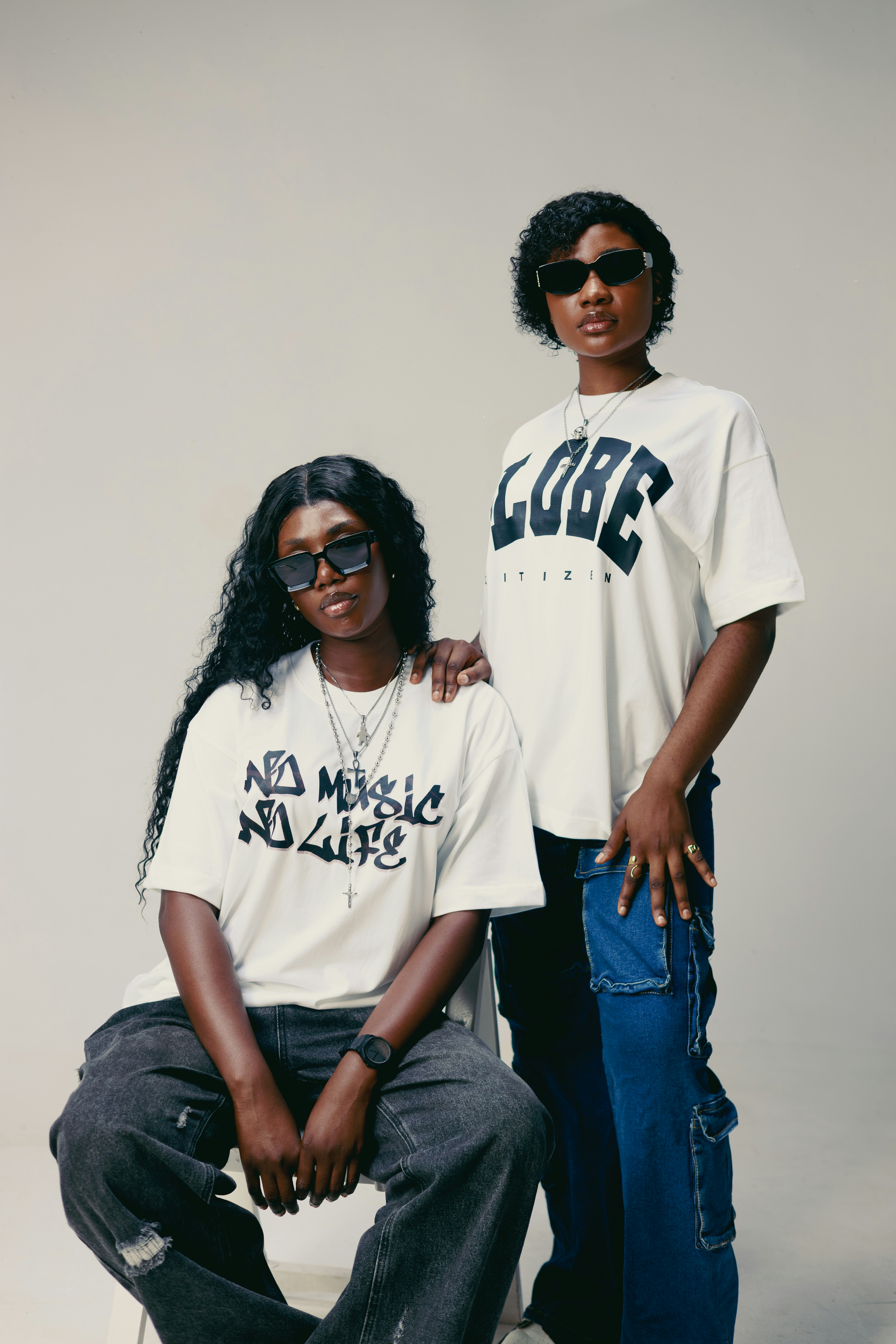 Dual Vibe: Studio Portrait of Two Sneakers and Sunglasses