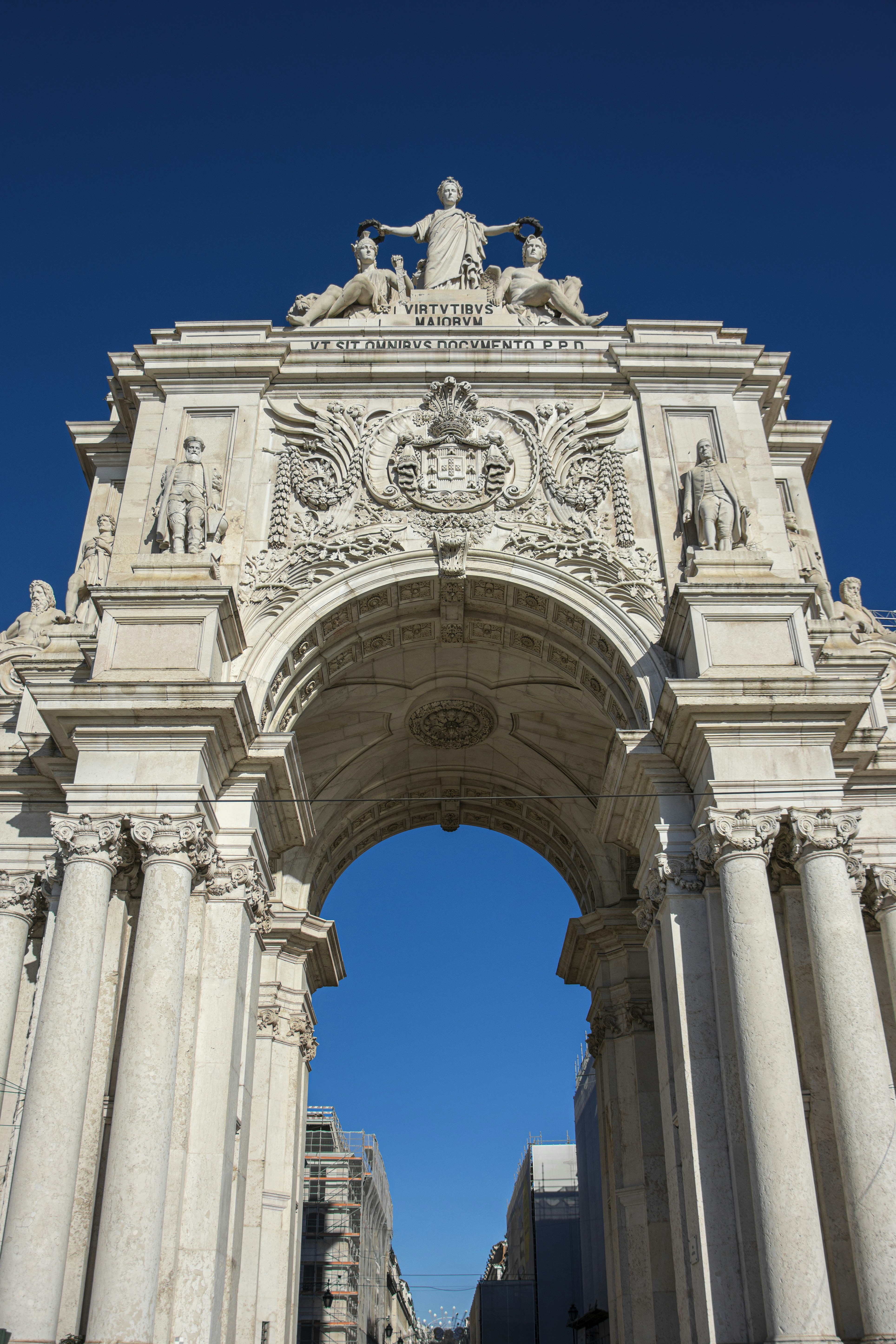 Stone Marble Gate: The Archway of Victory Amid a Blue Sky