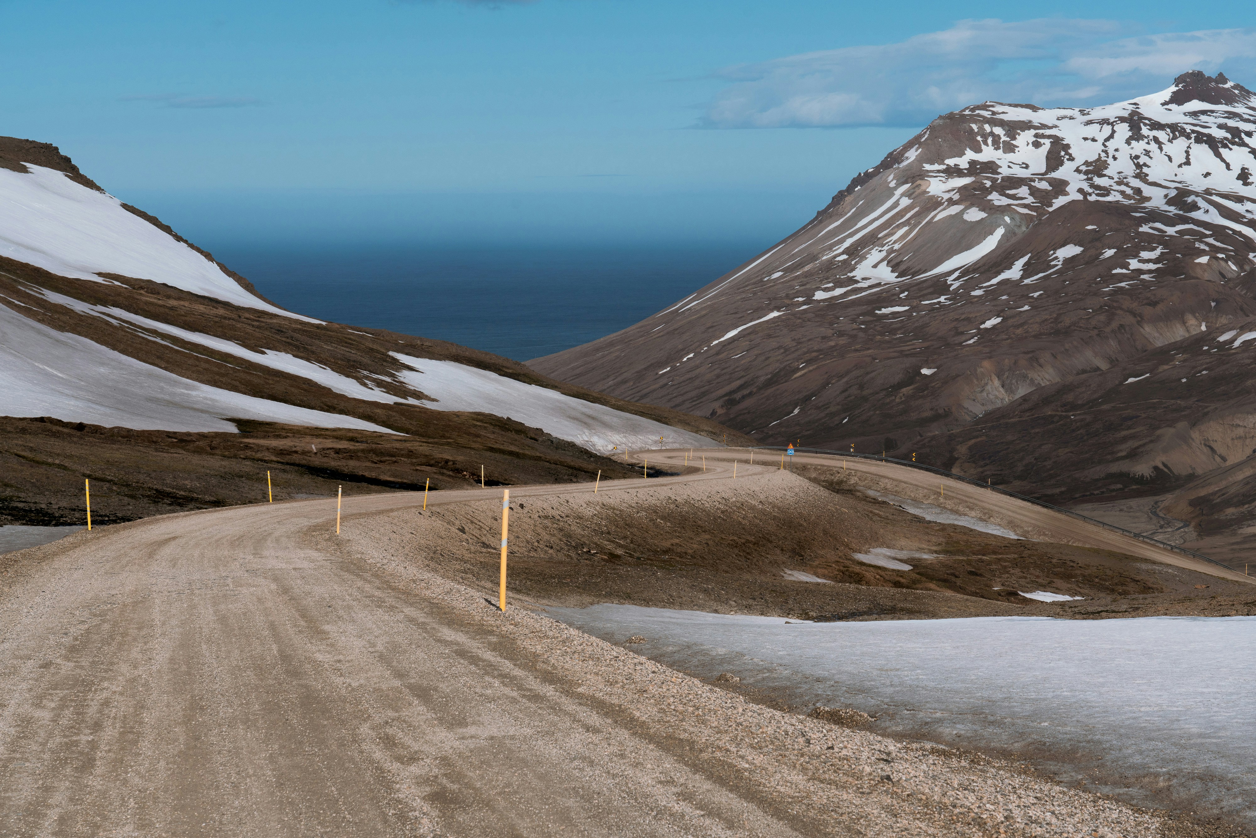 Dusty Glacier Road Curves toward the Sea