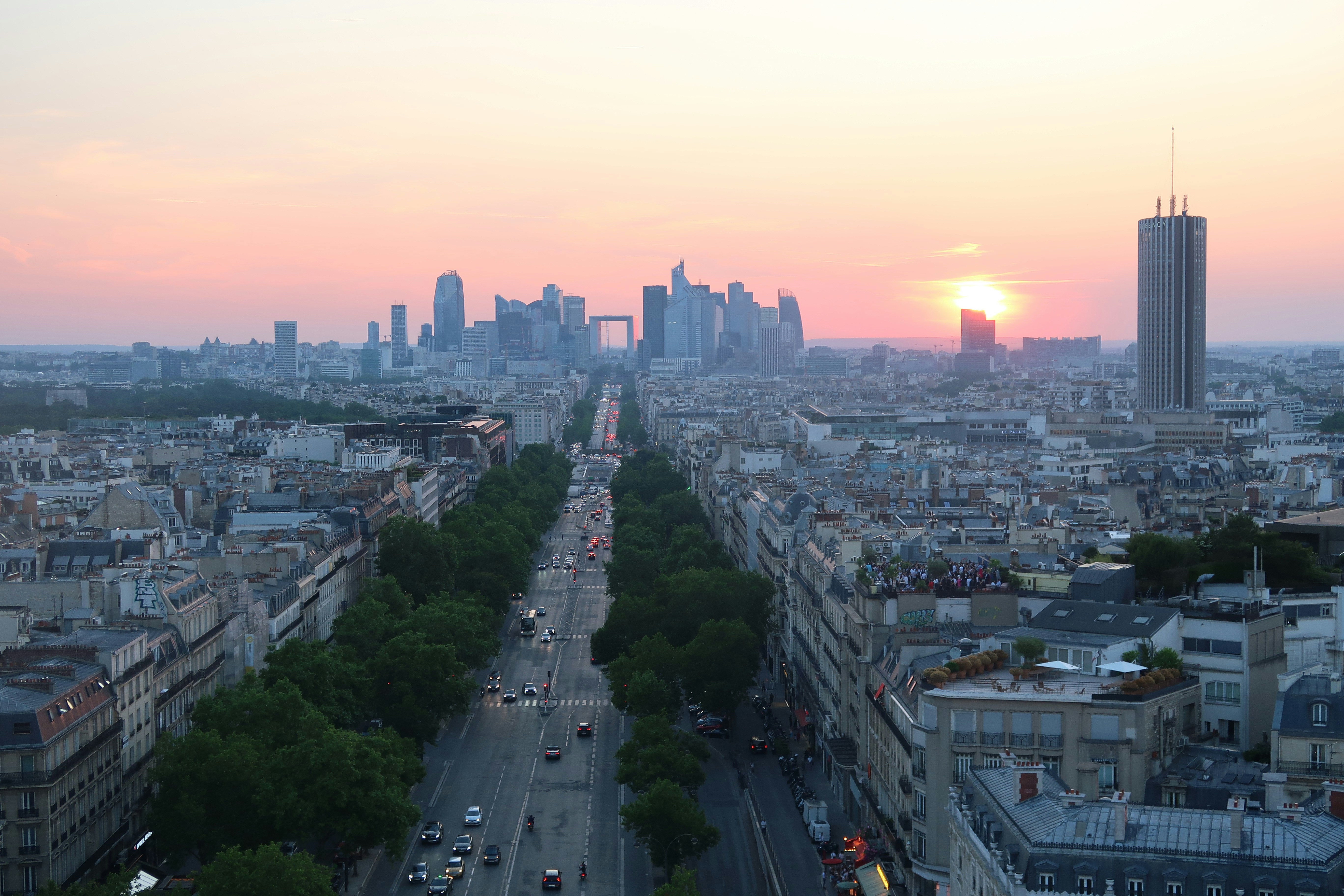 Sunset Convergence Over a Parisian Avenue