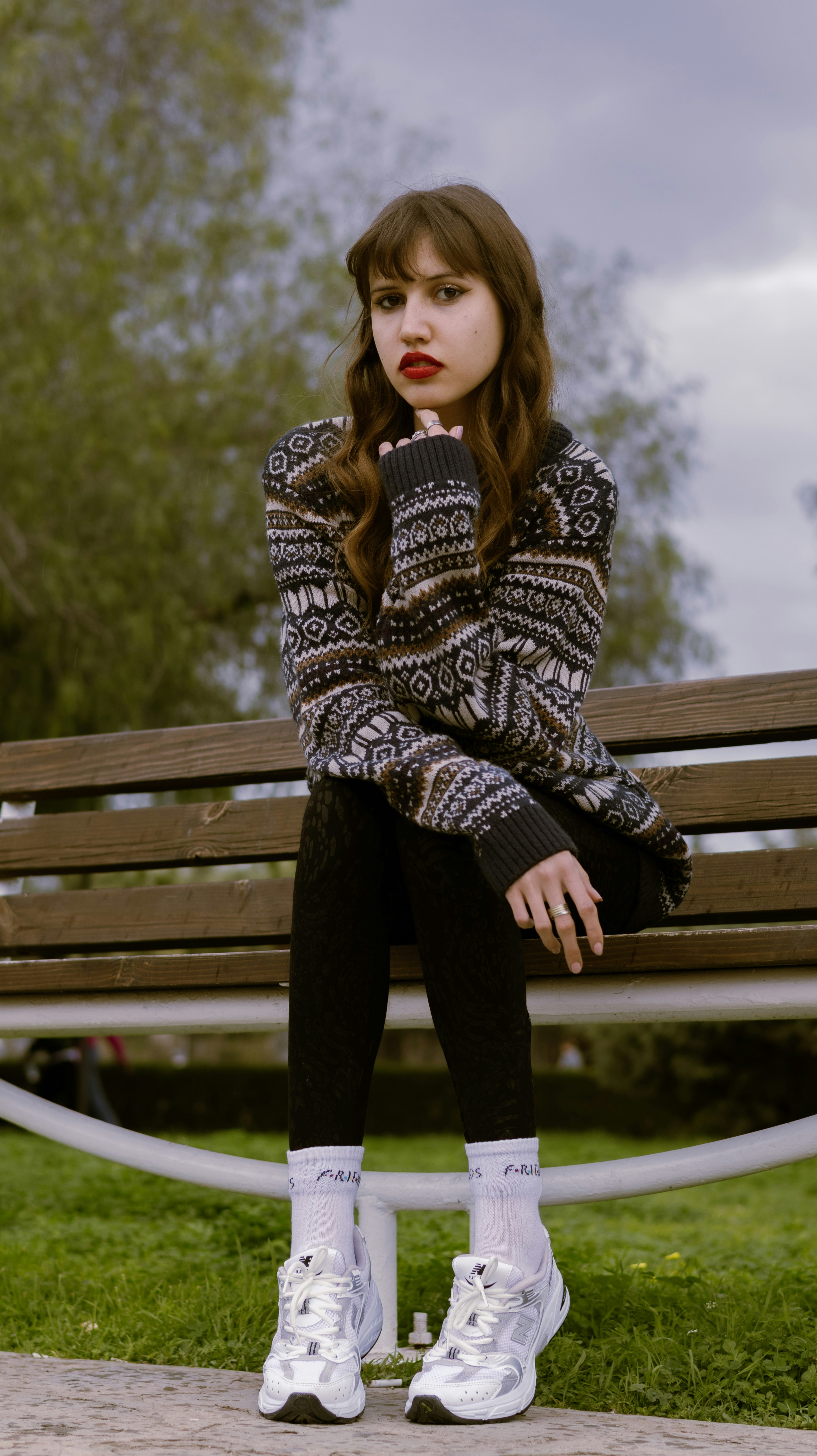 Youthful Contemplation on a Park Bench