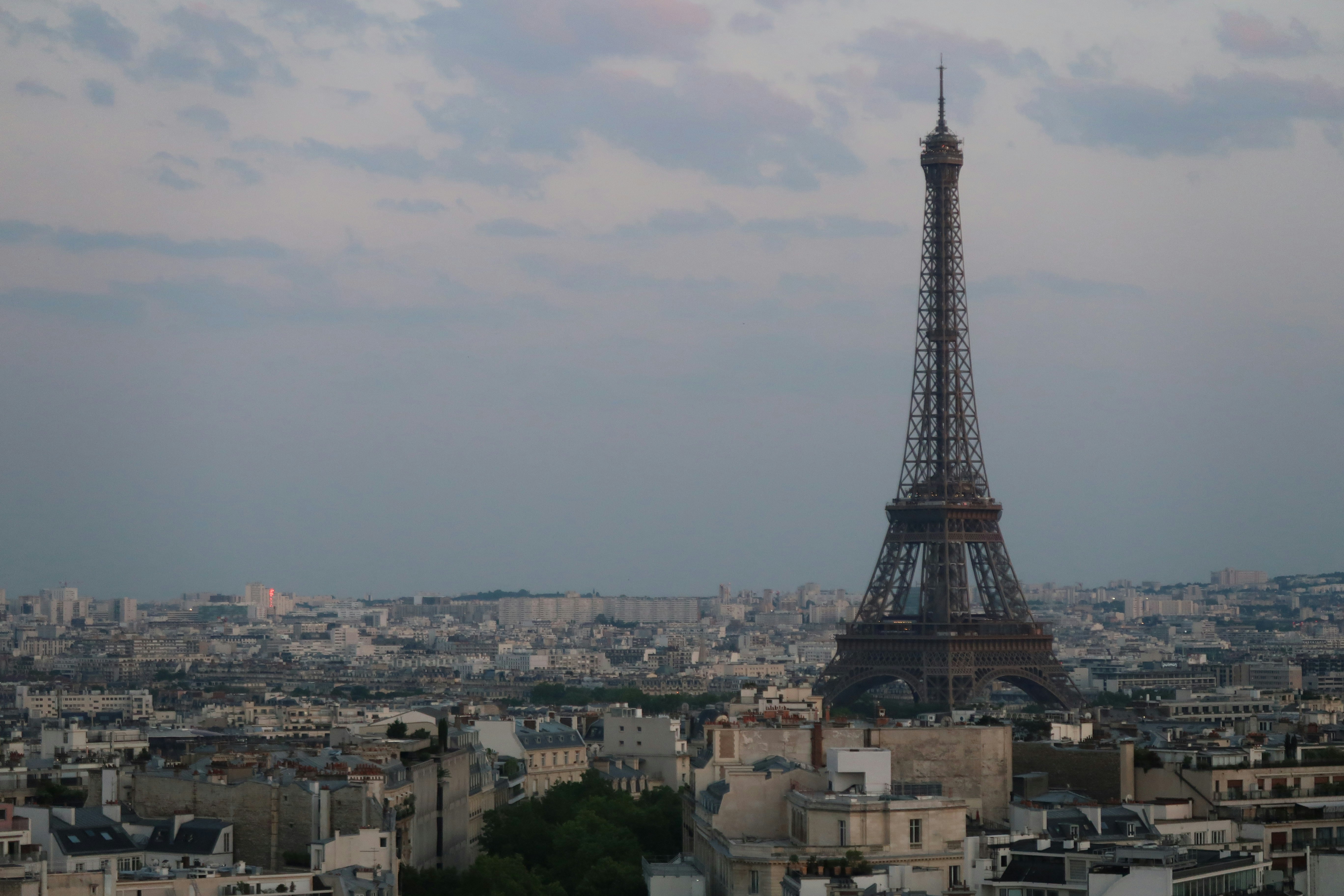 Parisian Skyline Mercy: The Eiffel Tower Surrounded by a Sea of Buildings