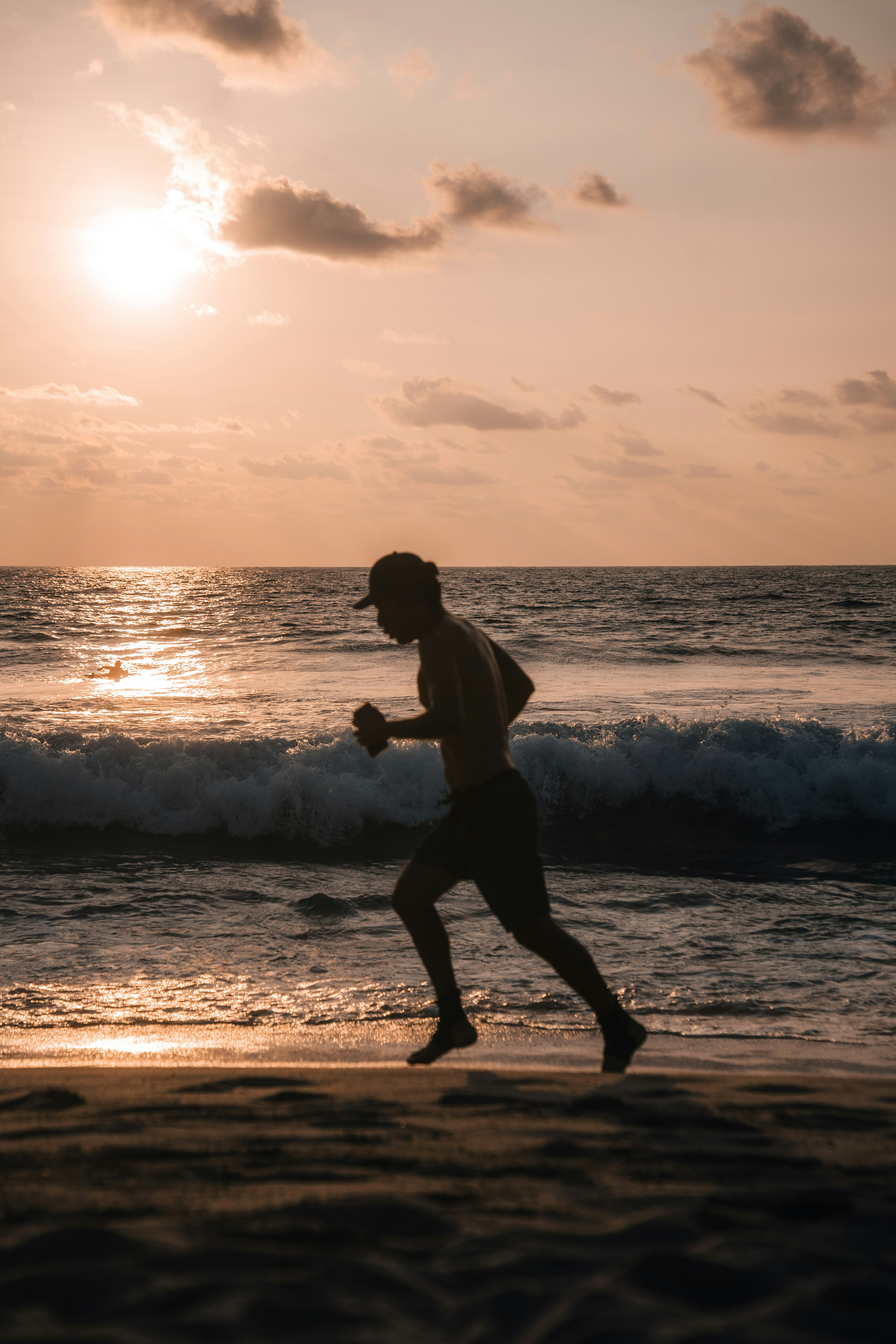 Endurance at Sunset: A Runner Traces the Shoreline