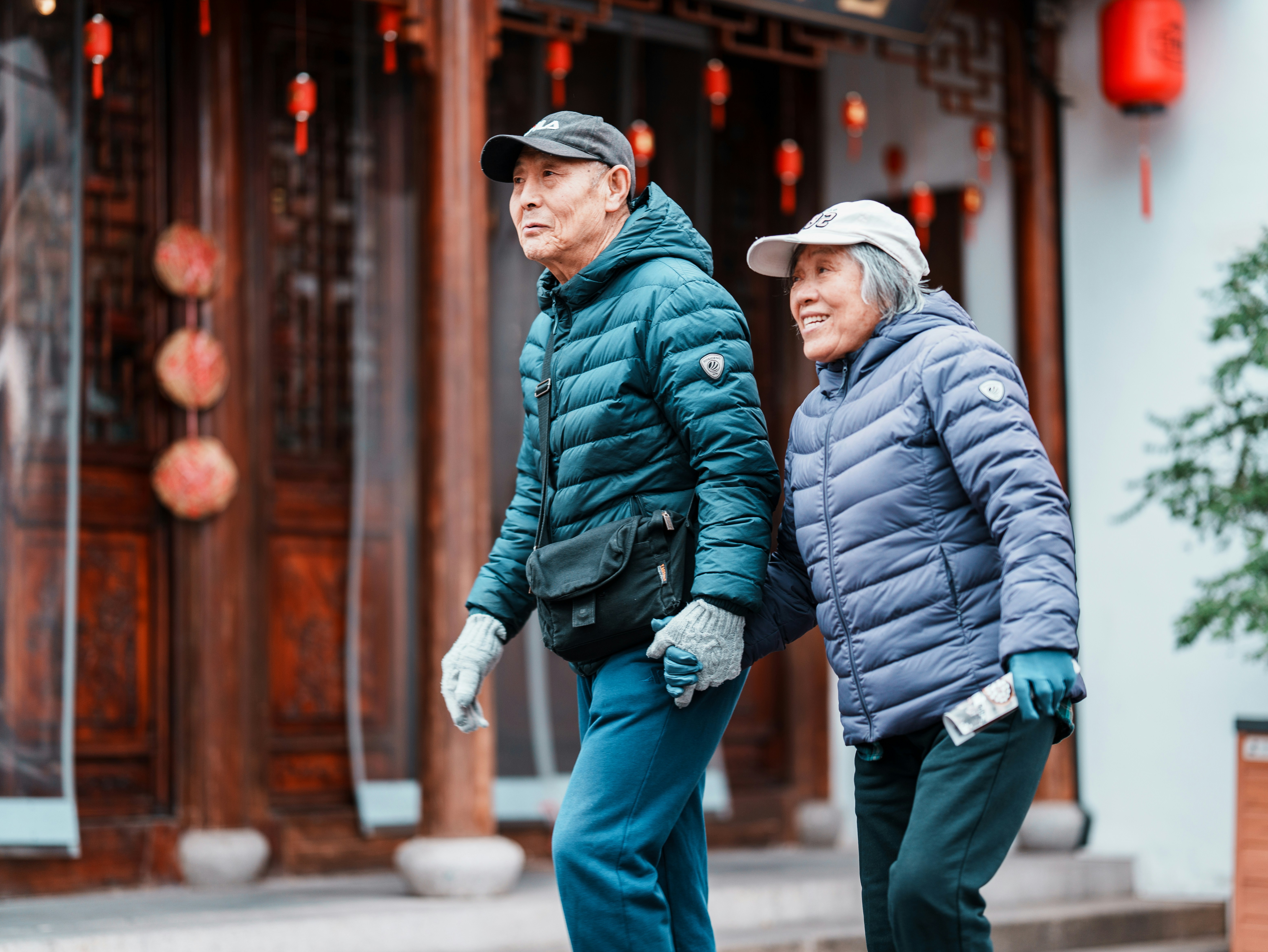 Two Travelers in a Lantern-lit Alley