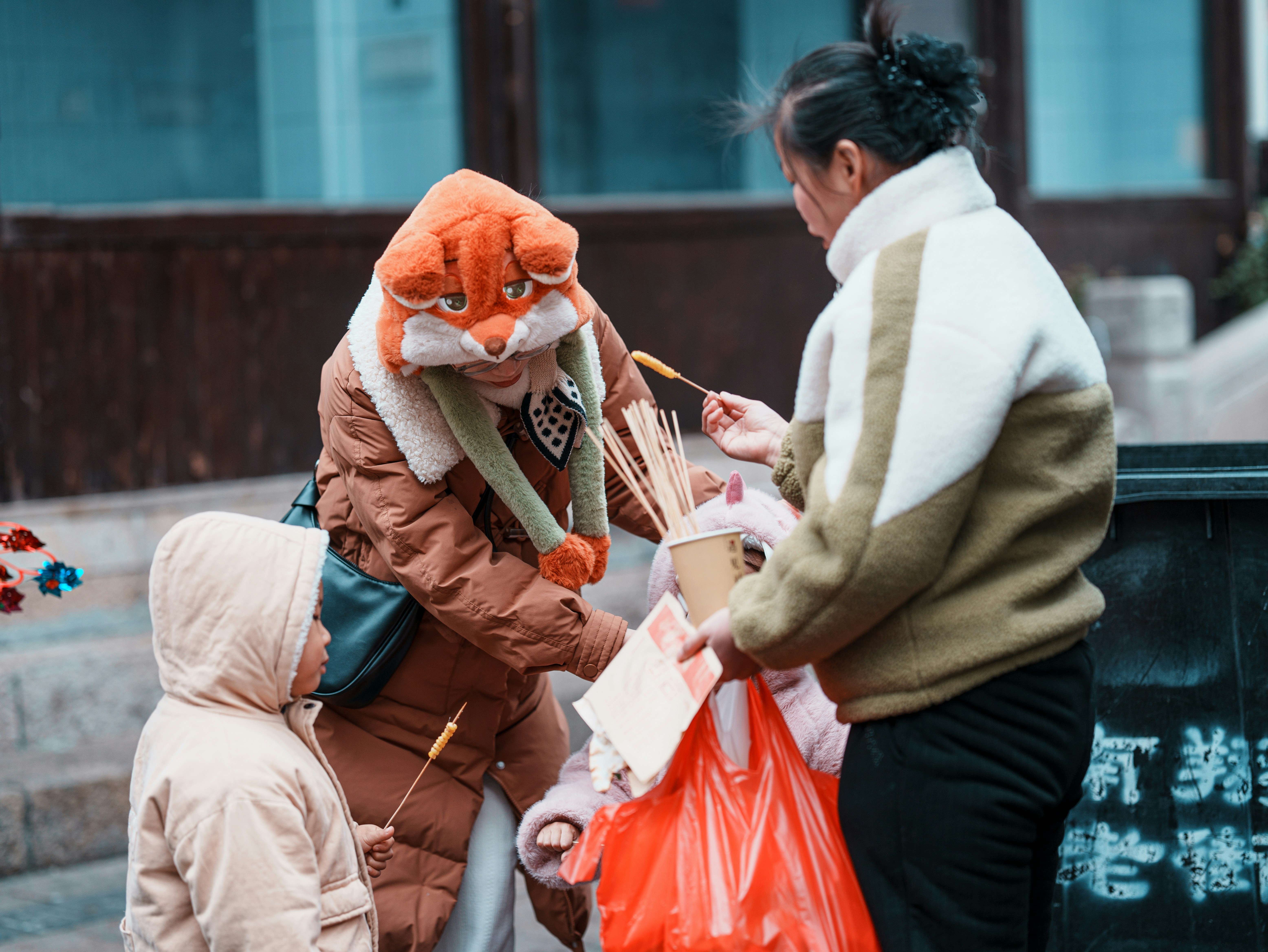 Street Market Masquerade: A Fox Mask and Festive Exchange