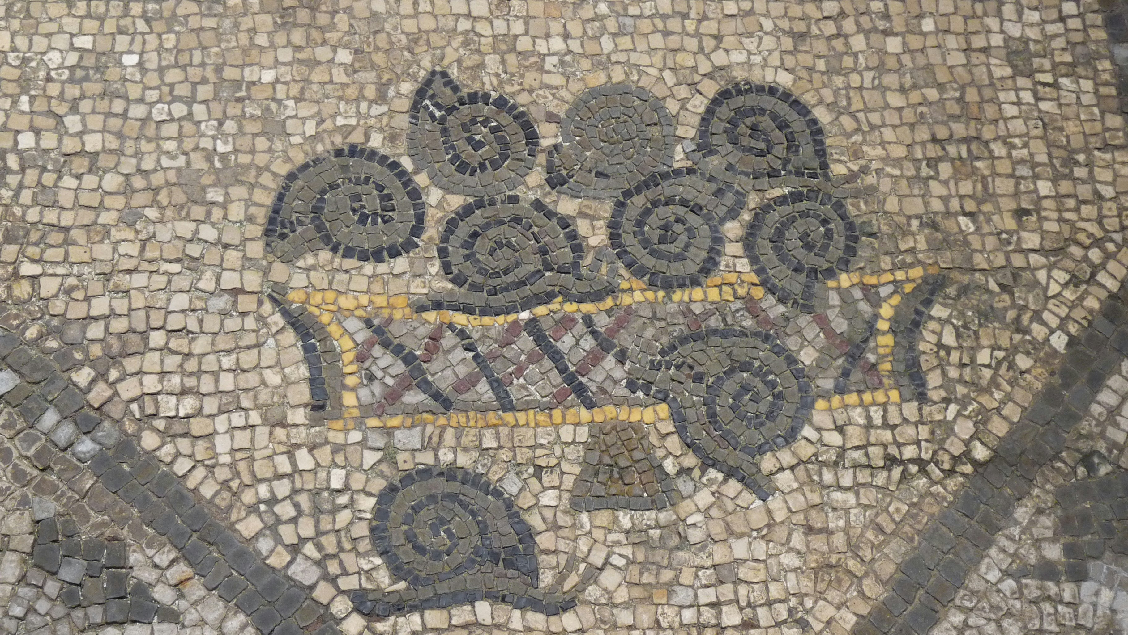 Mosaic Crest: Spirals and Shield of Stone