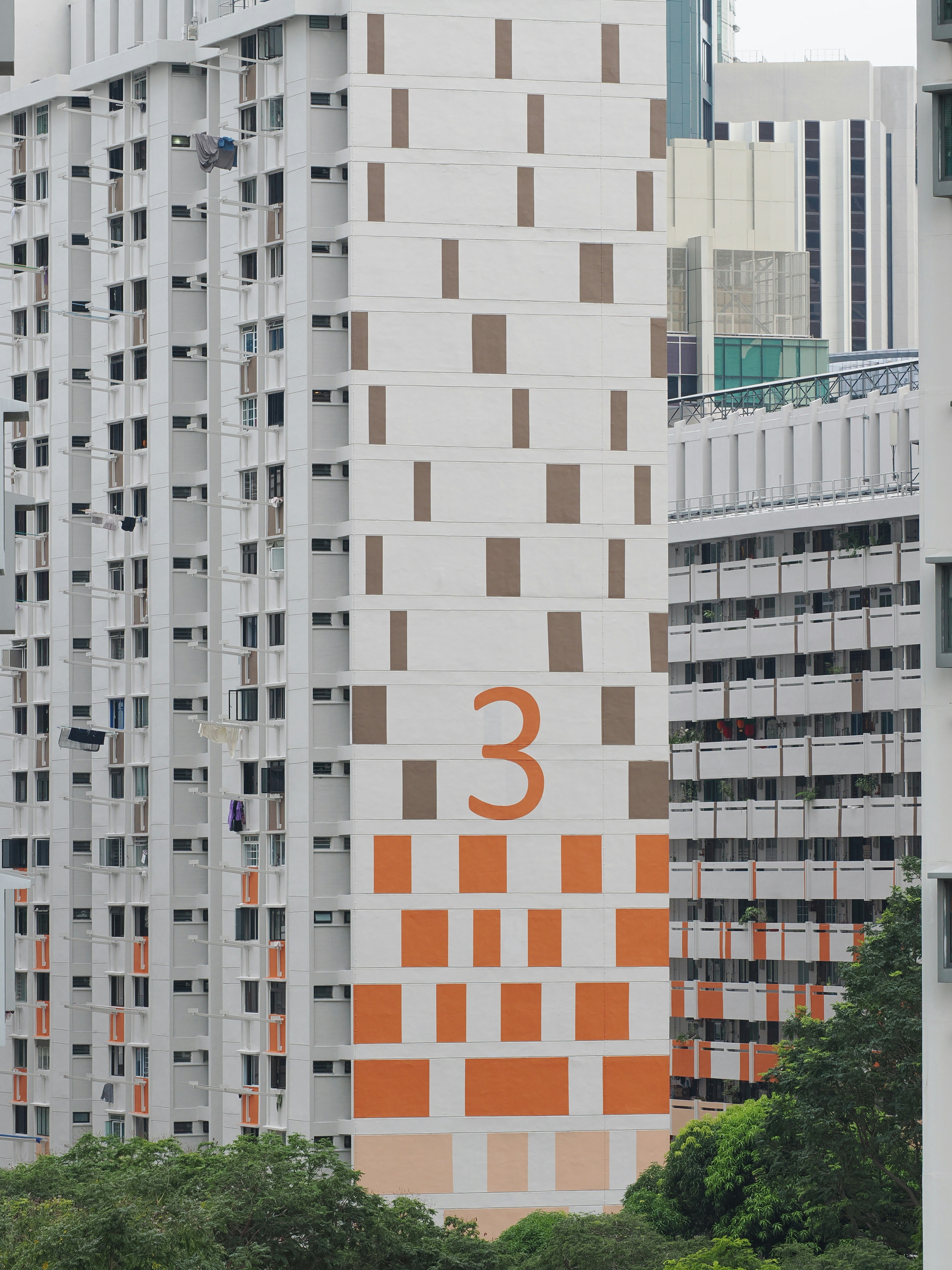 Vertical City Numbers: Tower 3 Anchors the Urban Grid
