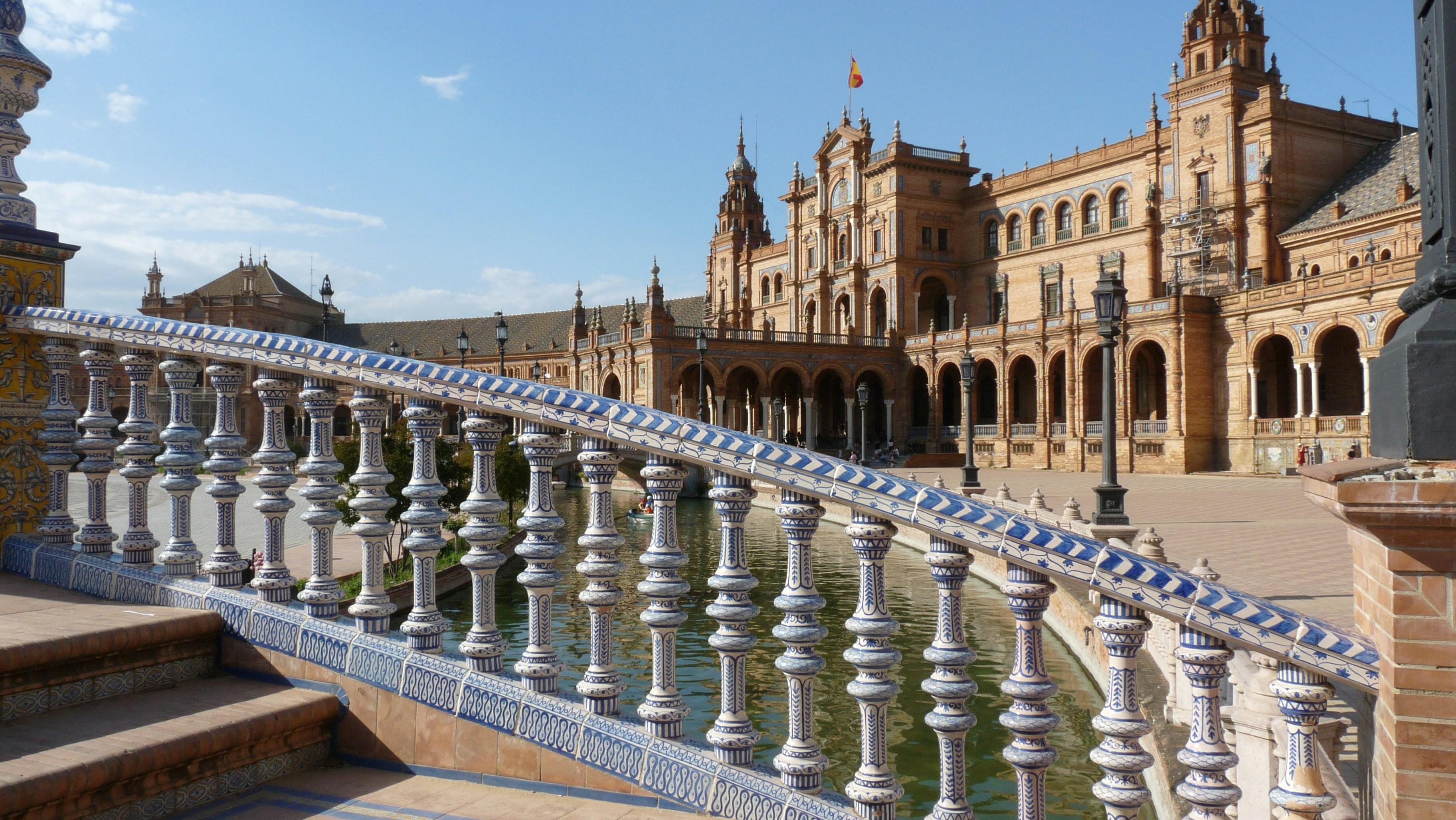 Ceremonial Courtyard: Sunlit Arcades and Ornate Balustrades