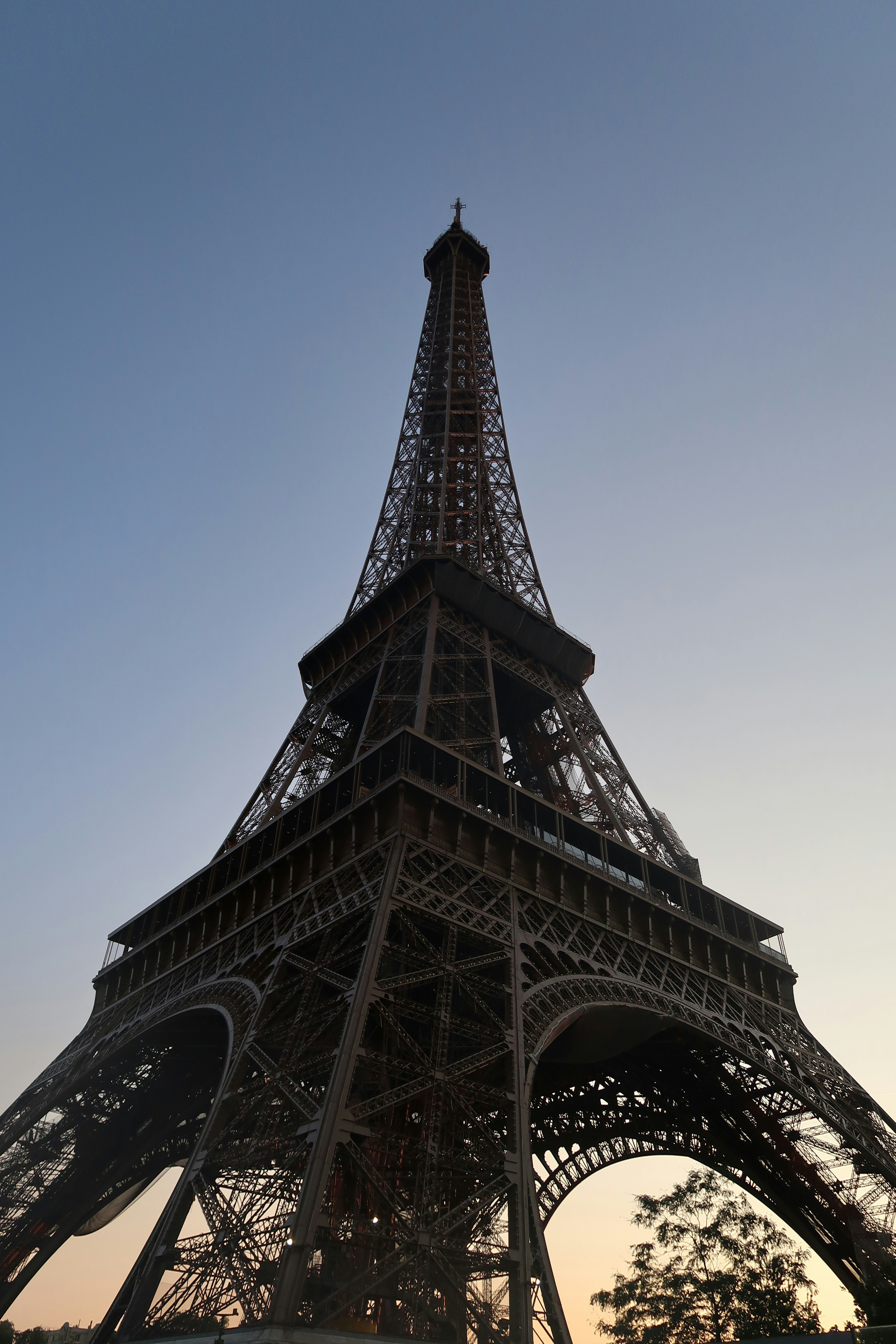 Parisian Iron Lace: The Eiffel Tower Reaches Toward a Clear Evening Sky