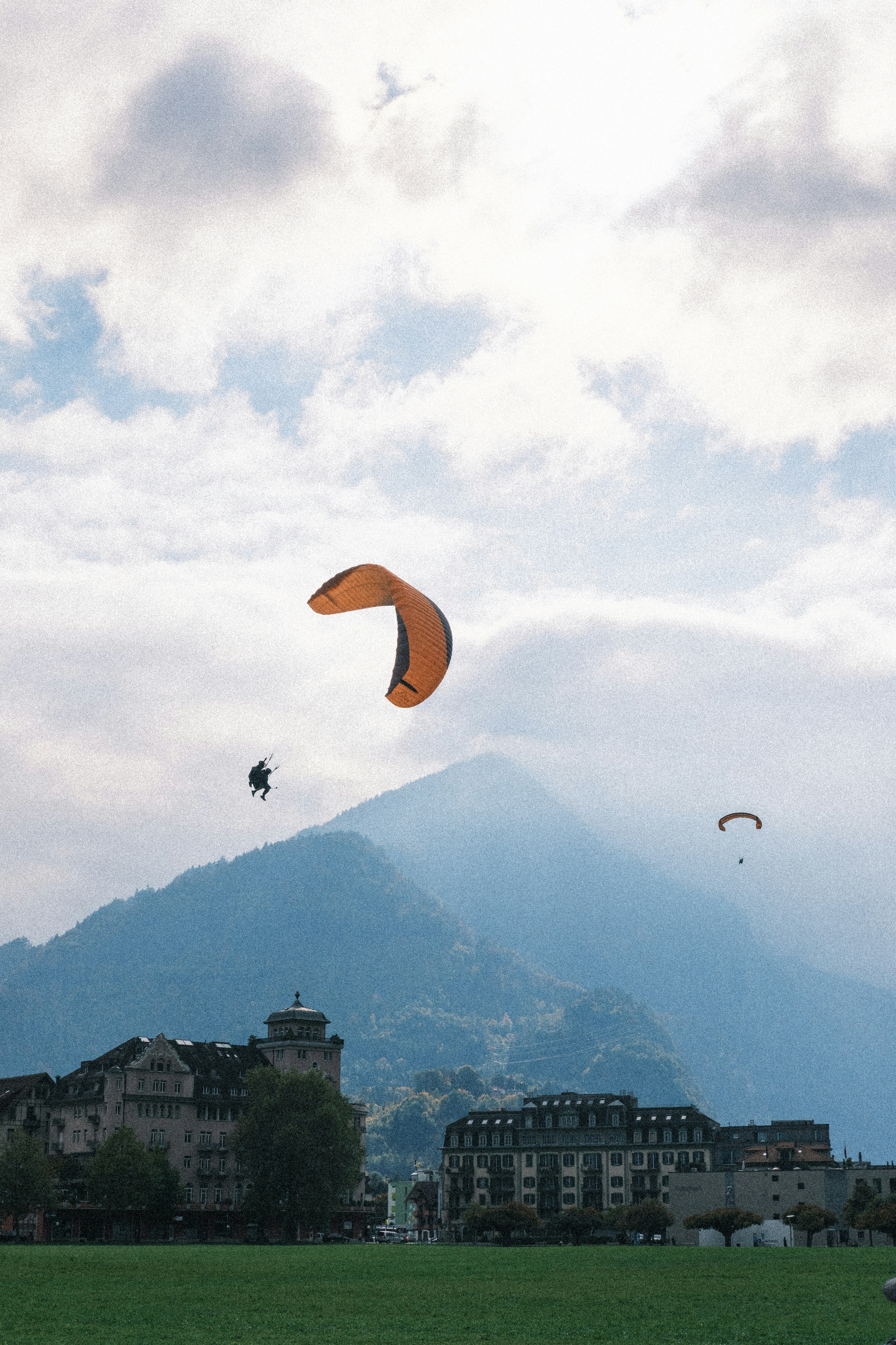 Aerial Glide Over Alpine Town