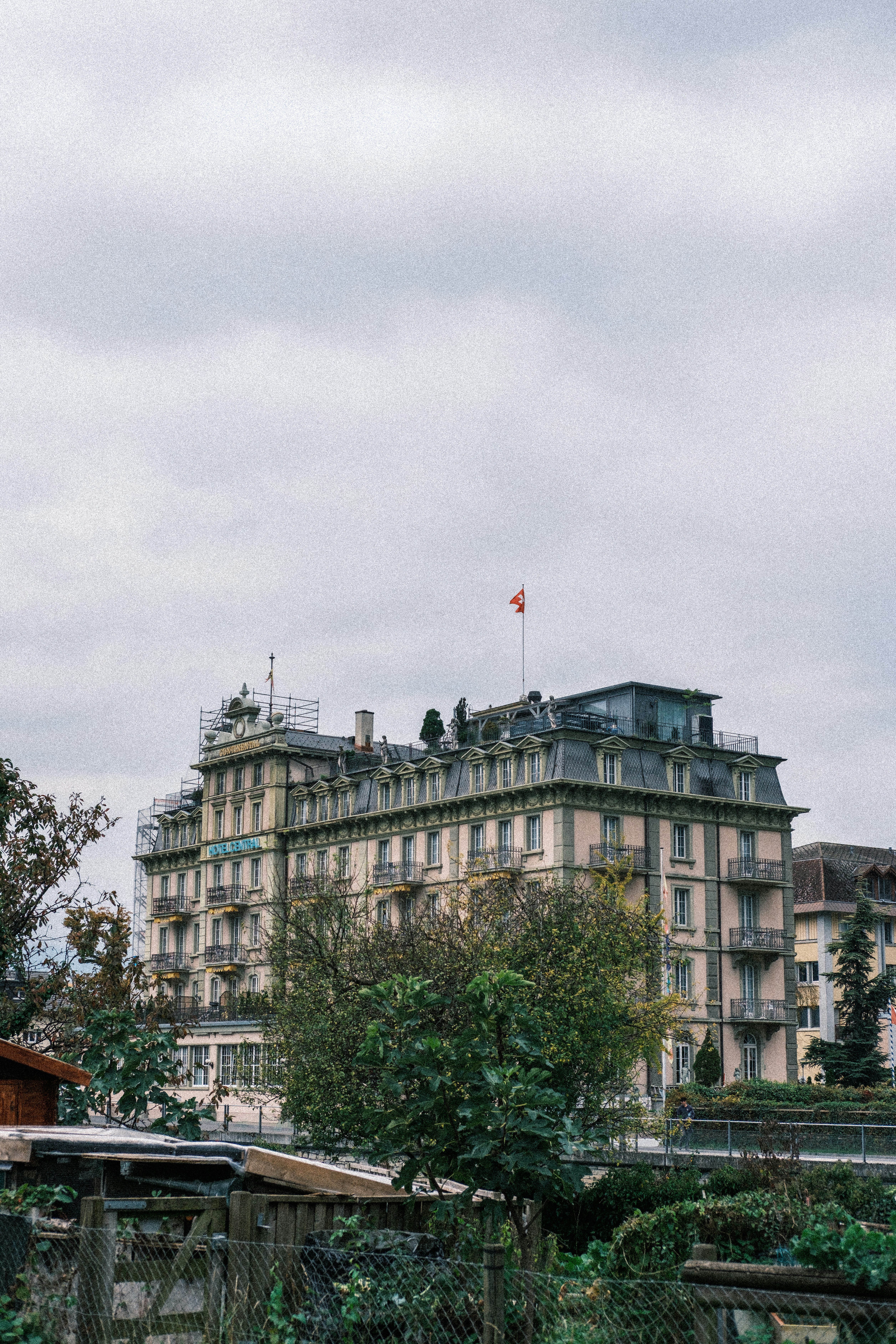 Historic Building Rising Above a Quiet Urban Garden
