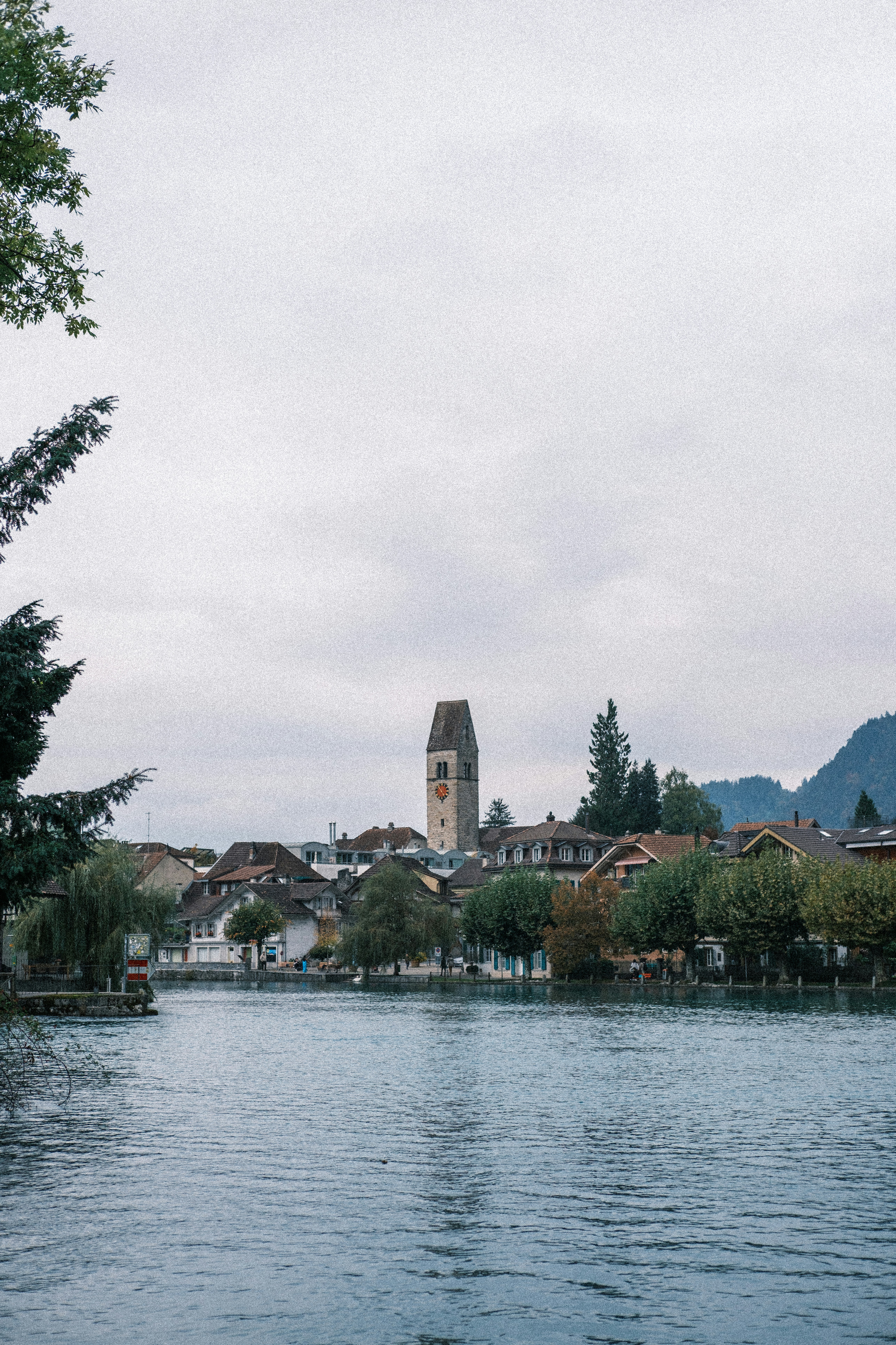Lakeside Clocktower Overlooking a Tranquil Swiss Village
