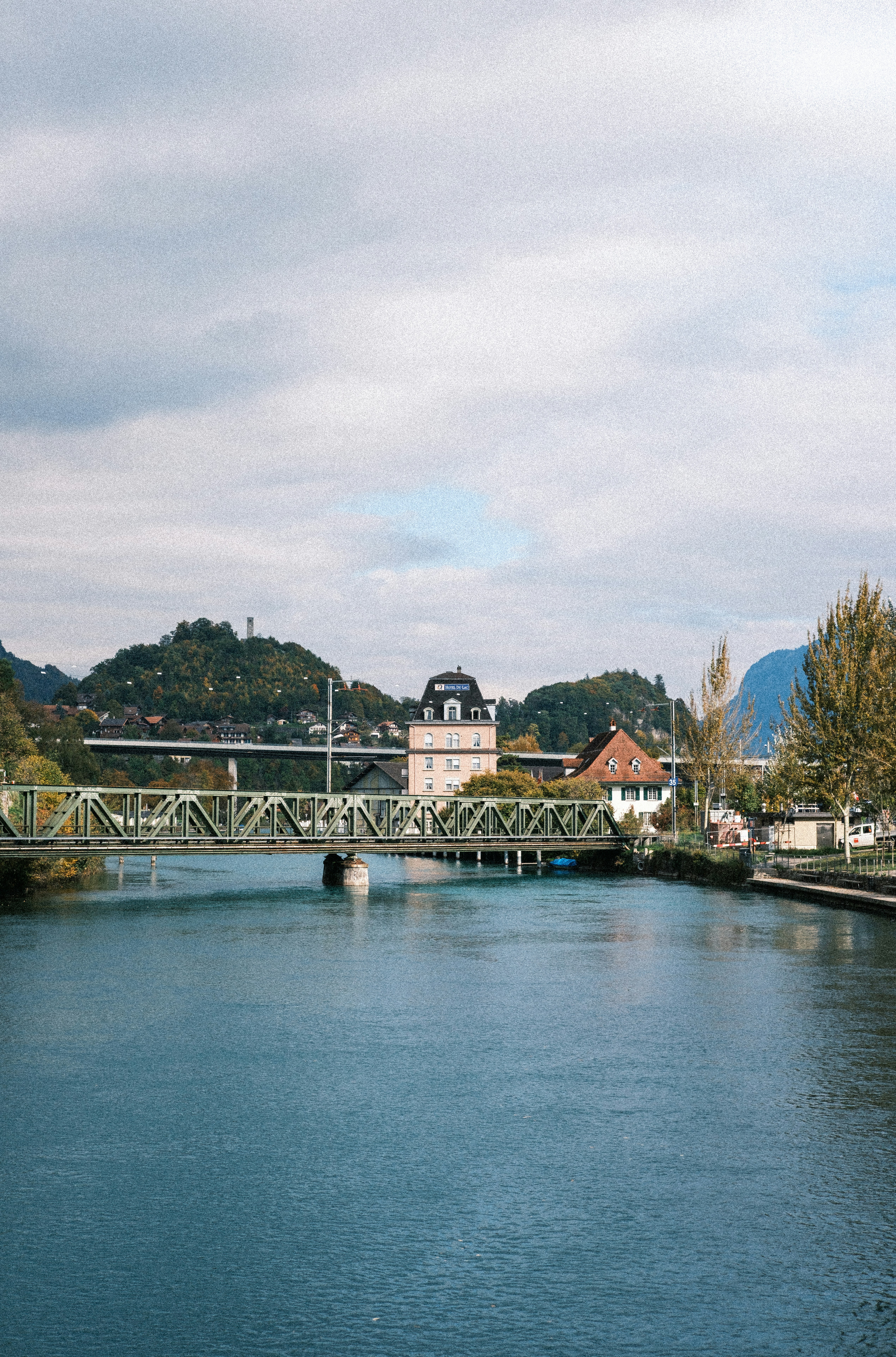 Riverside Cloister: A Quiet Riverside Town with a Bridge and Hills
