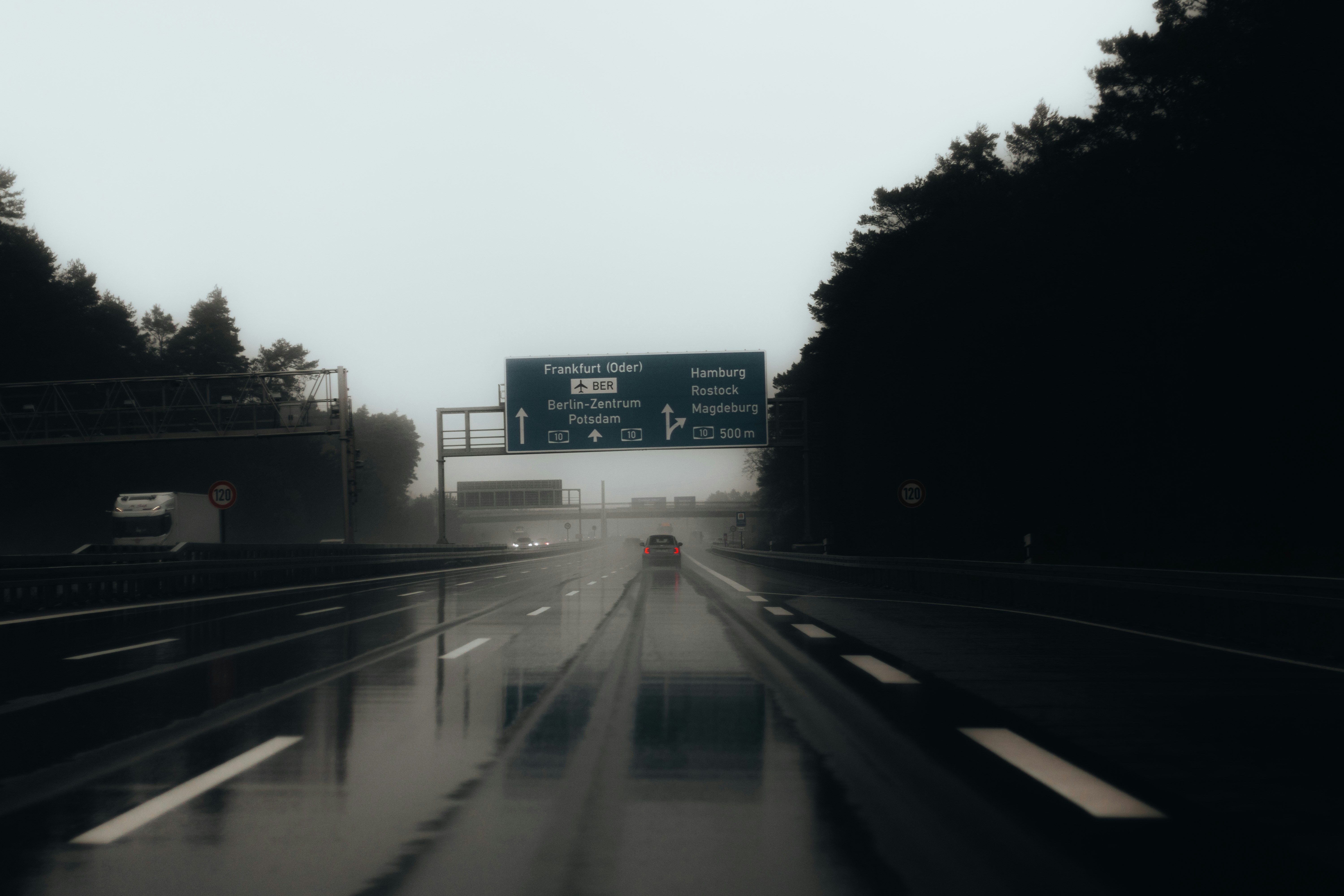 Highway Rain: Center Lane Toward the Horizon