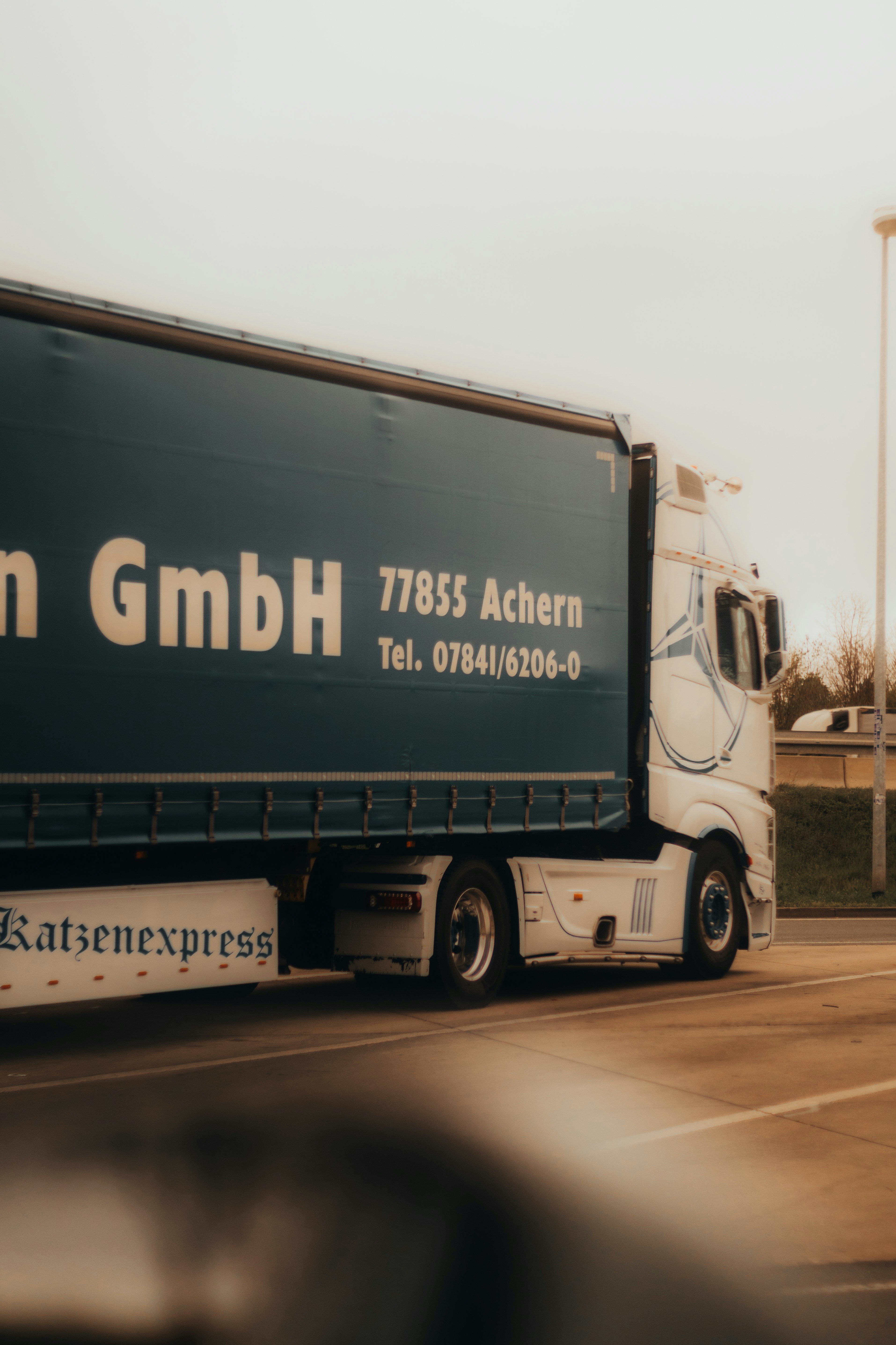 Delivery Giants: A Side View of a Freight Truck at Rest