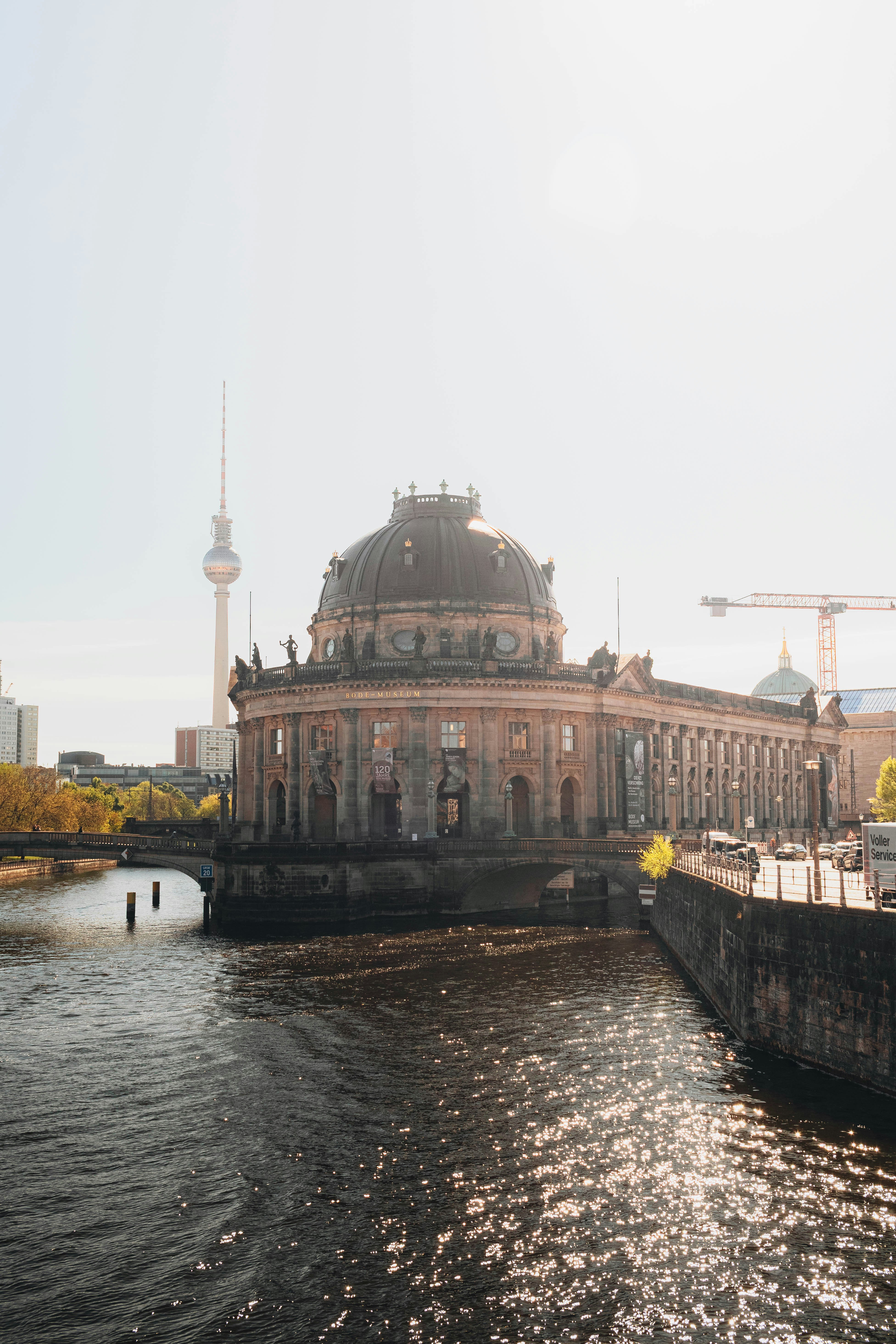 The Dome by the Spree: Historic Arts Building Under a Bright City Sky