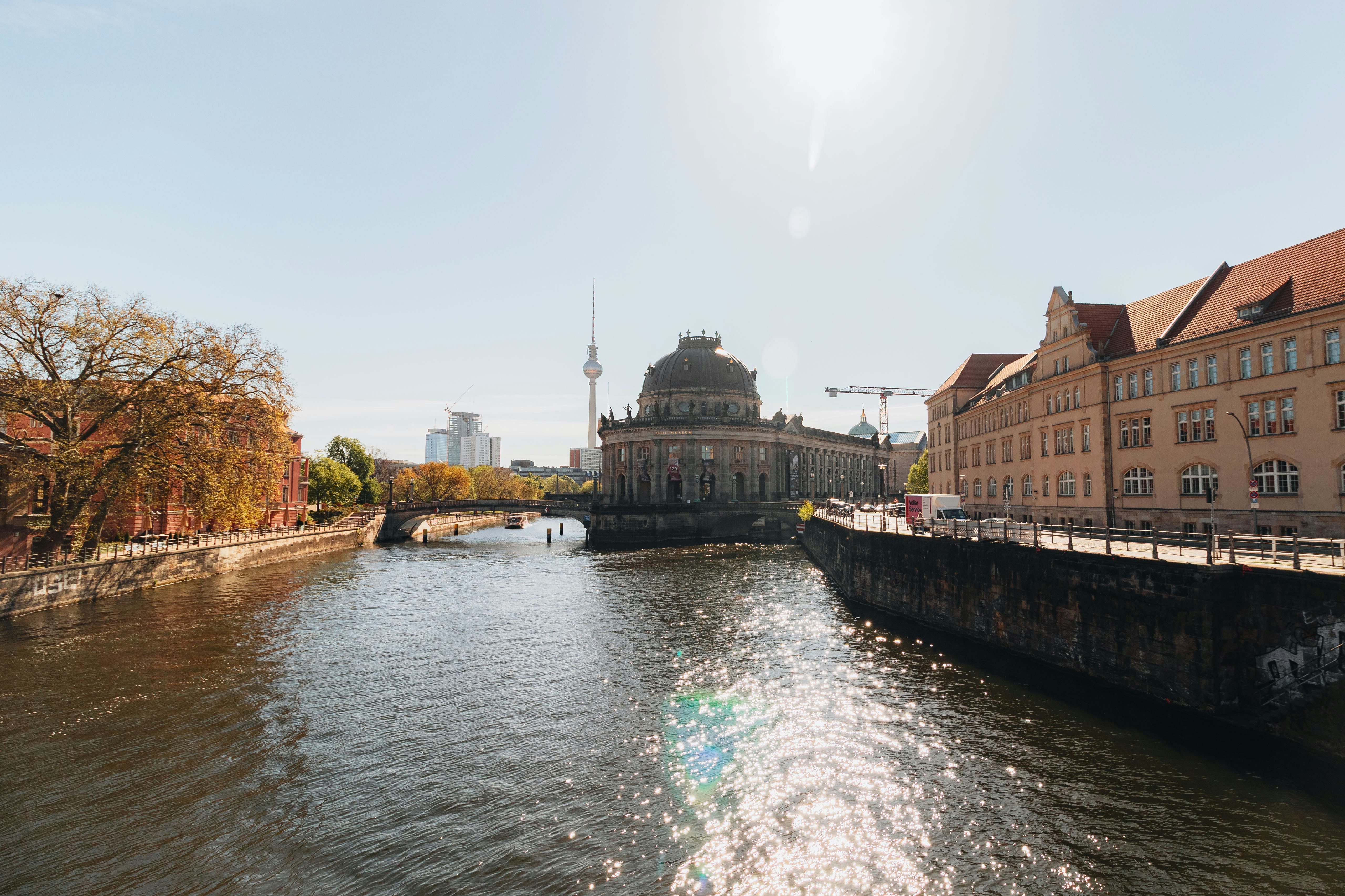 Riverside Domes and Towers: Sunlit Berlin-like Waterway