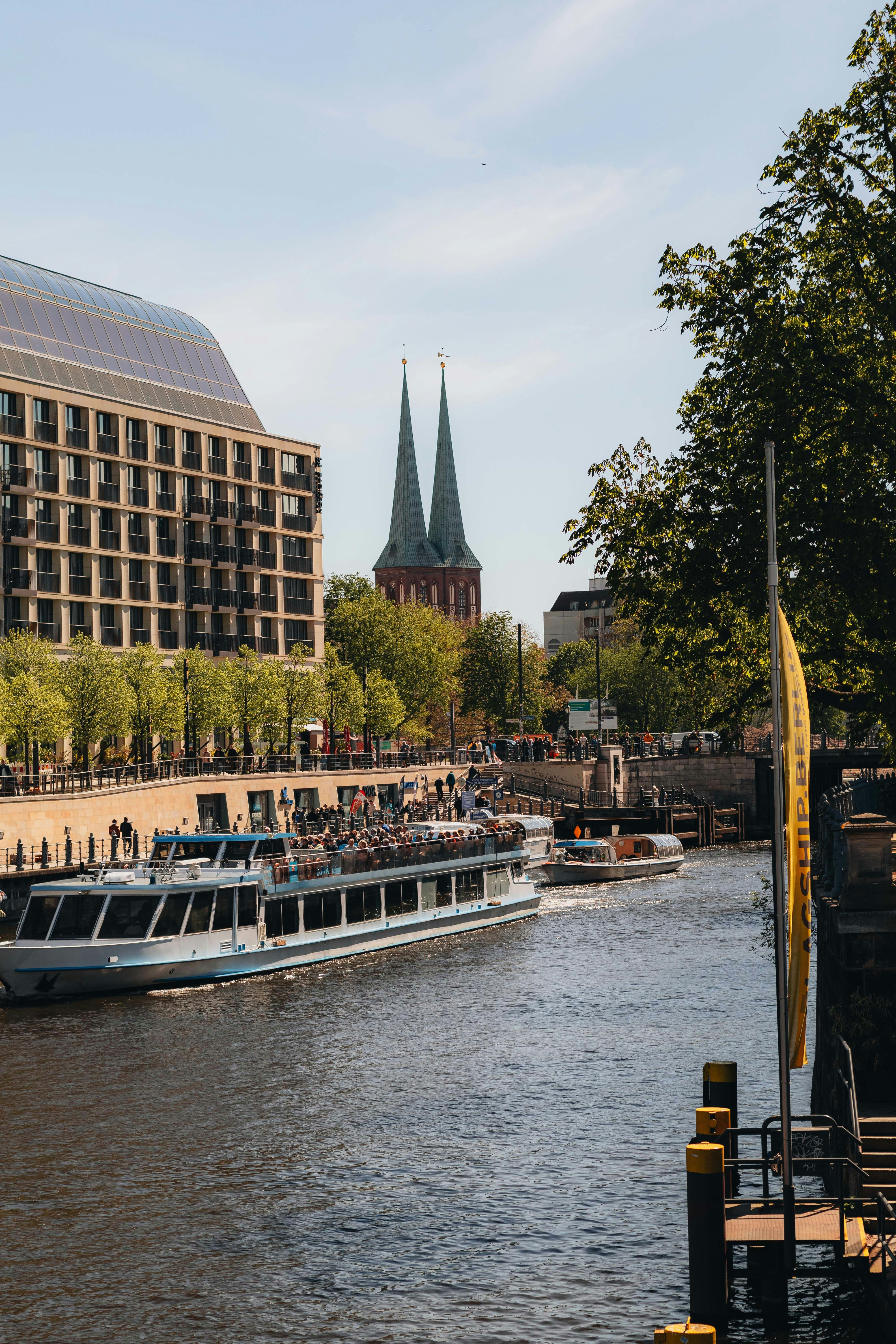 Rivertown Boatside: Cathedral Spires and Riverside Transit