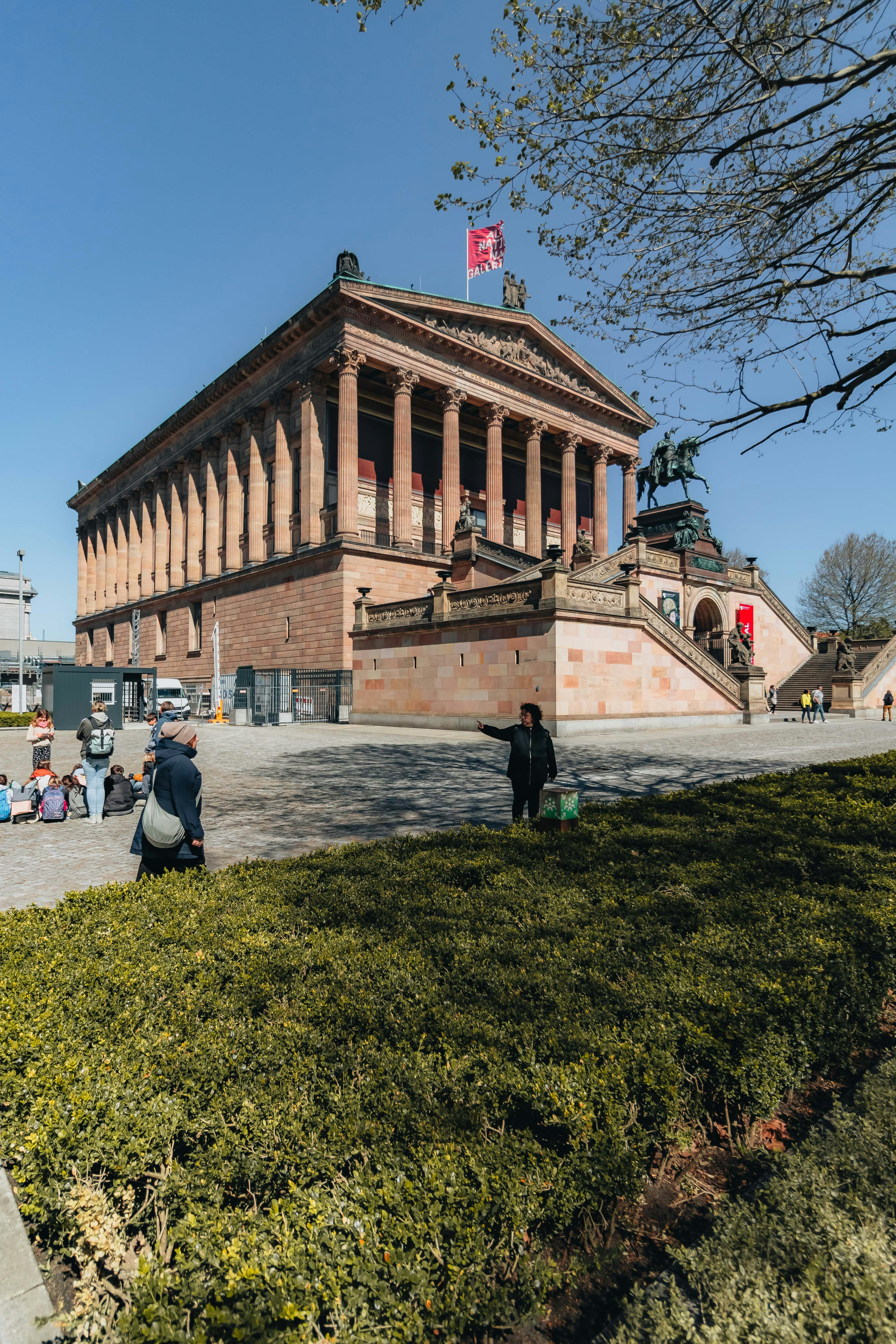 Temple of Freighted History: A Neoclassical Grandeur Under Clear Blue