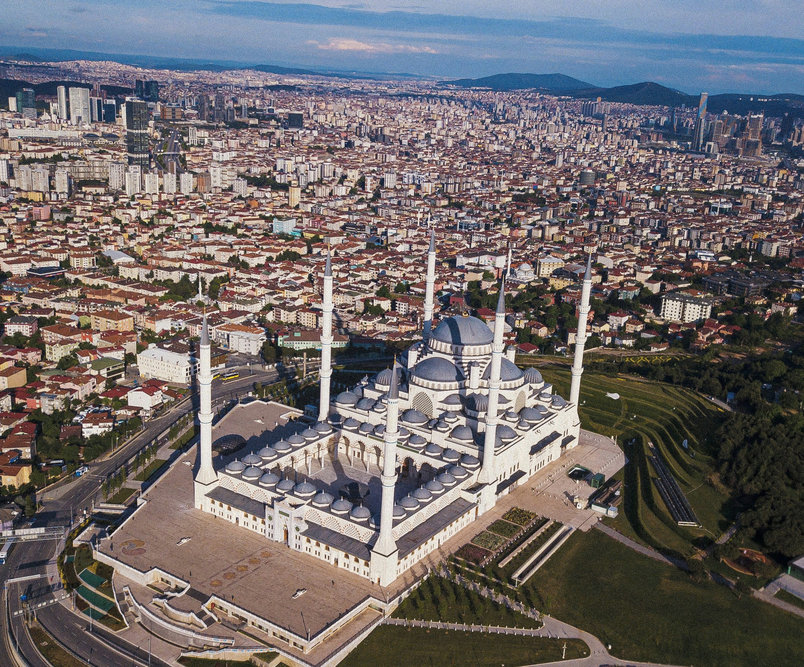 Majestic White Mosque Overlooking a Labyrinth of Rooftops