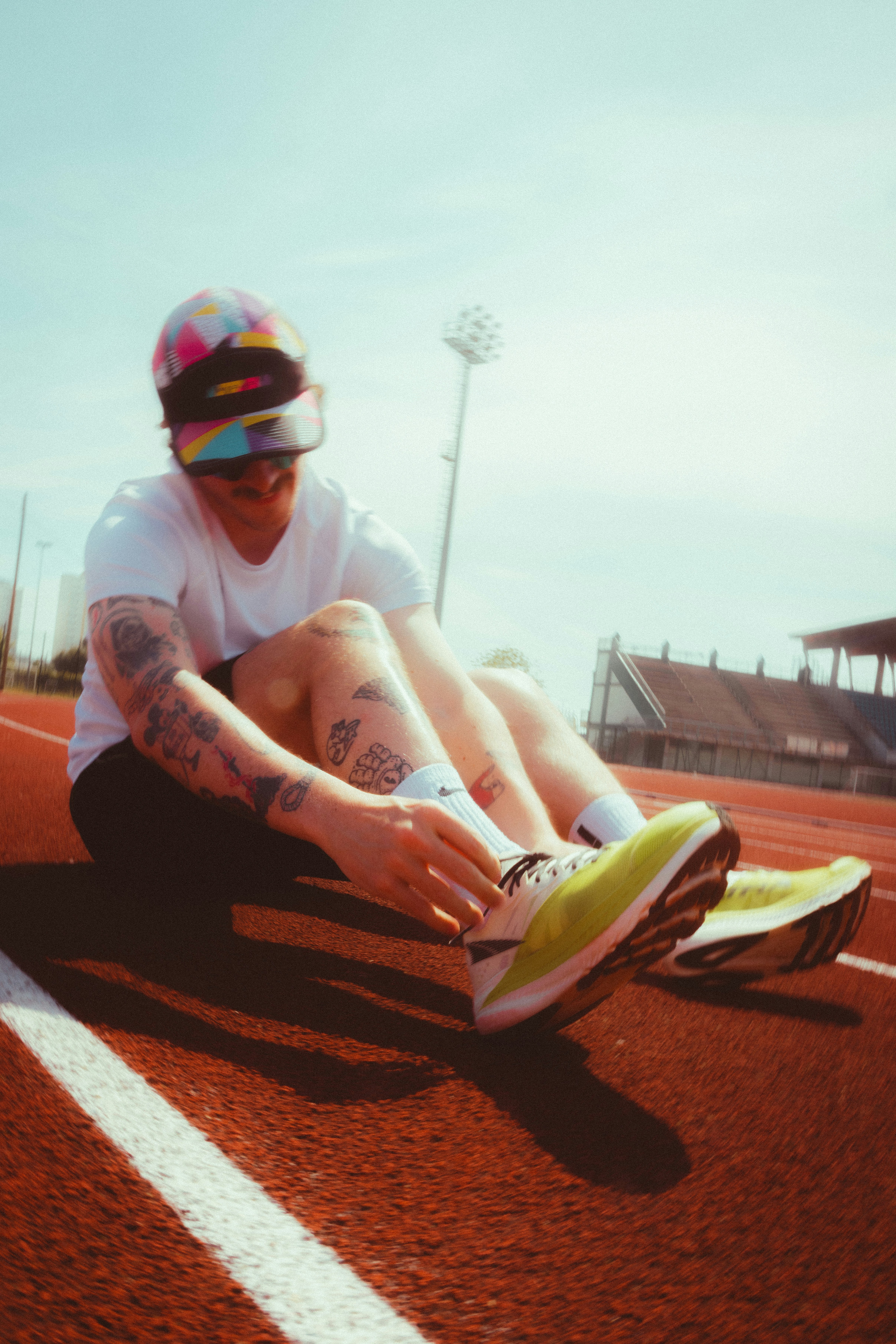 Low-angle Self-Tie: On the Track with Neon Shoes