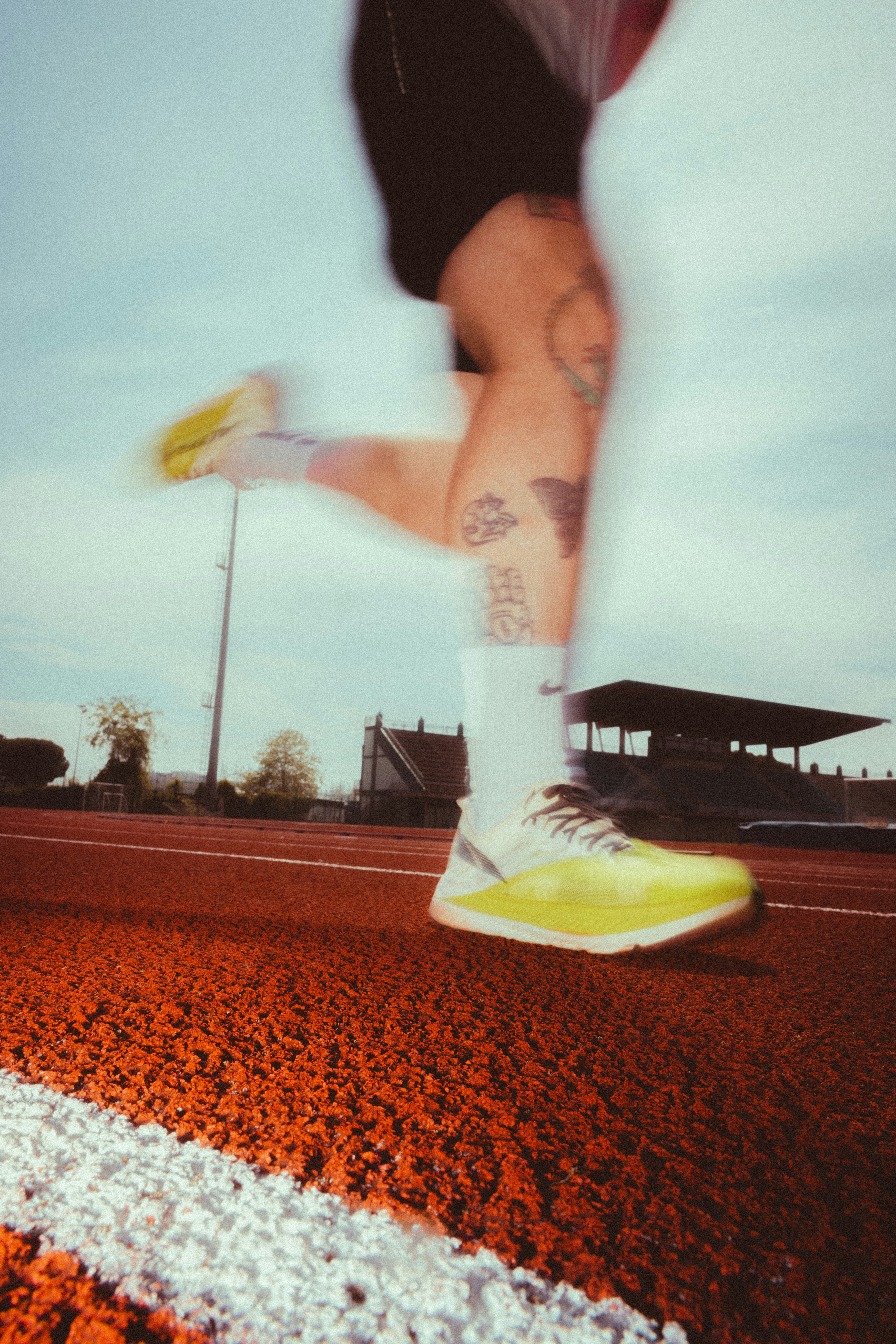 Motion Blur on the Track: A Runner in Mid-Step