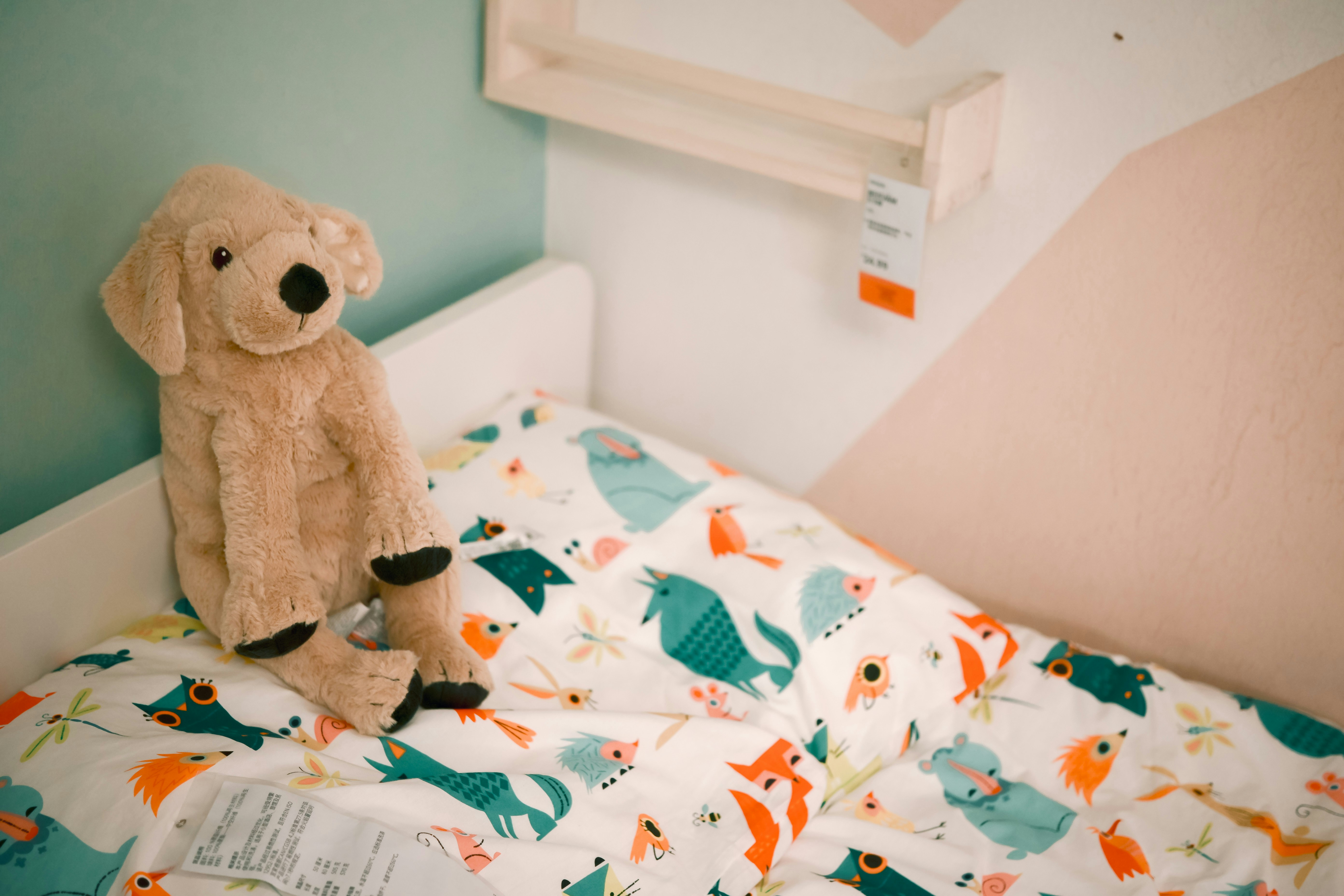 Soft Toy on a Patterned Bed: Quiet Corner of a Child’s Room