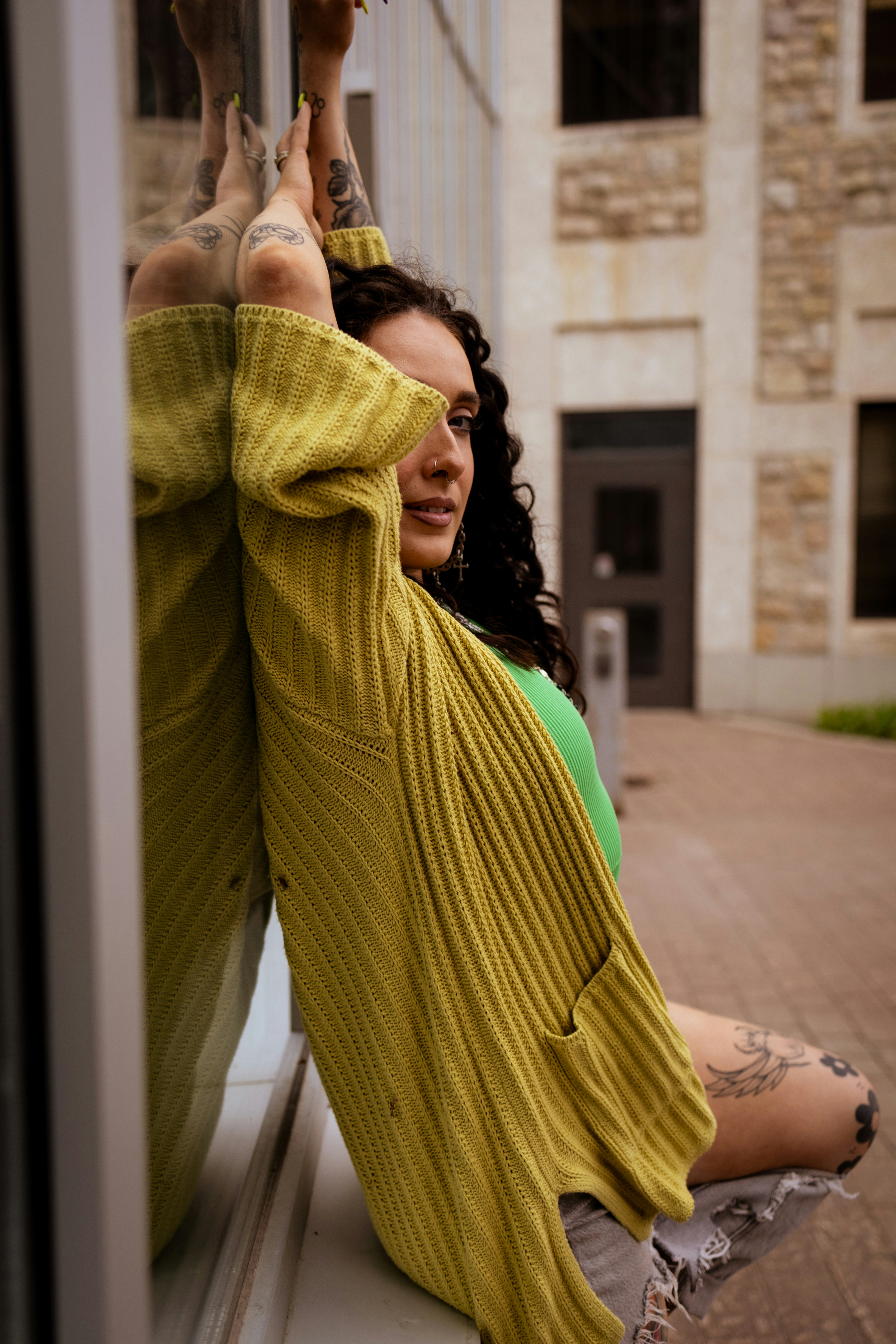 Green Confidence: A Moment of Quiet Strength in Yellow Knit