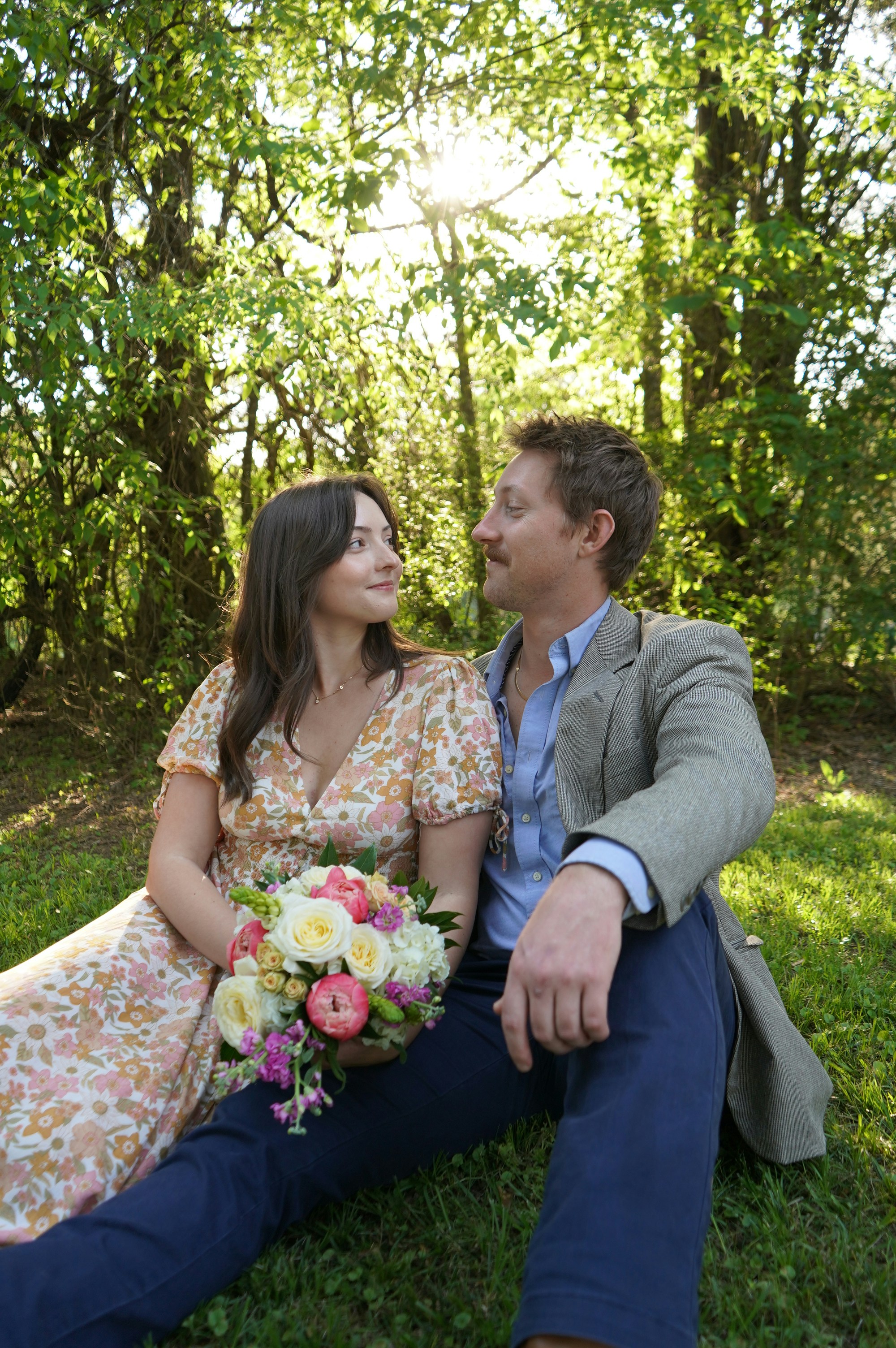 Sunlit Garden Moment: A couple in spring bloom