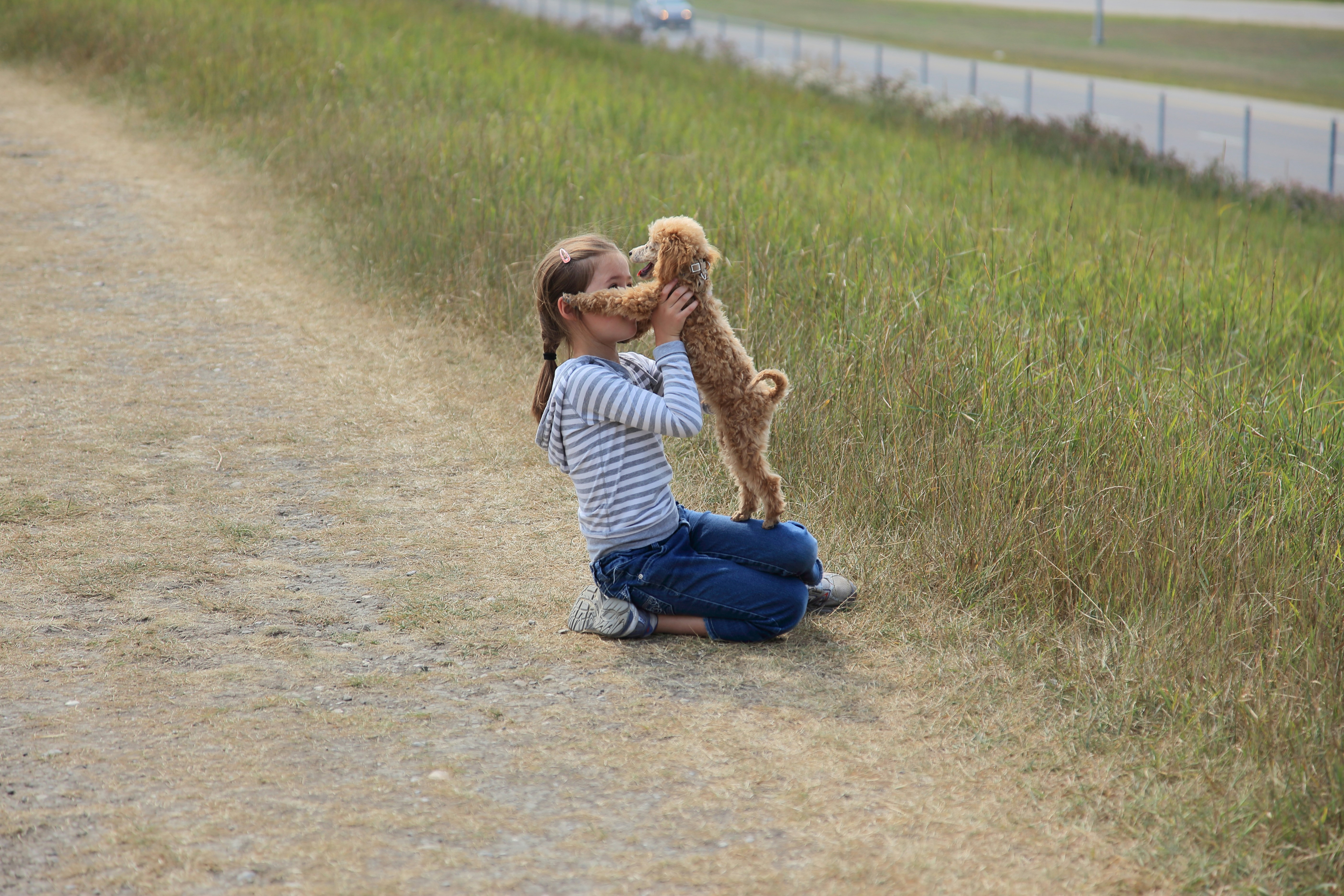 Laughter in the Grass: A Girl and Her Tiny Friend