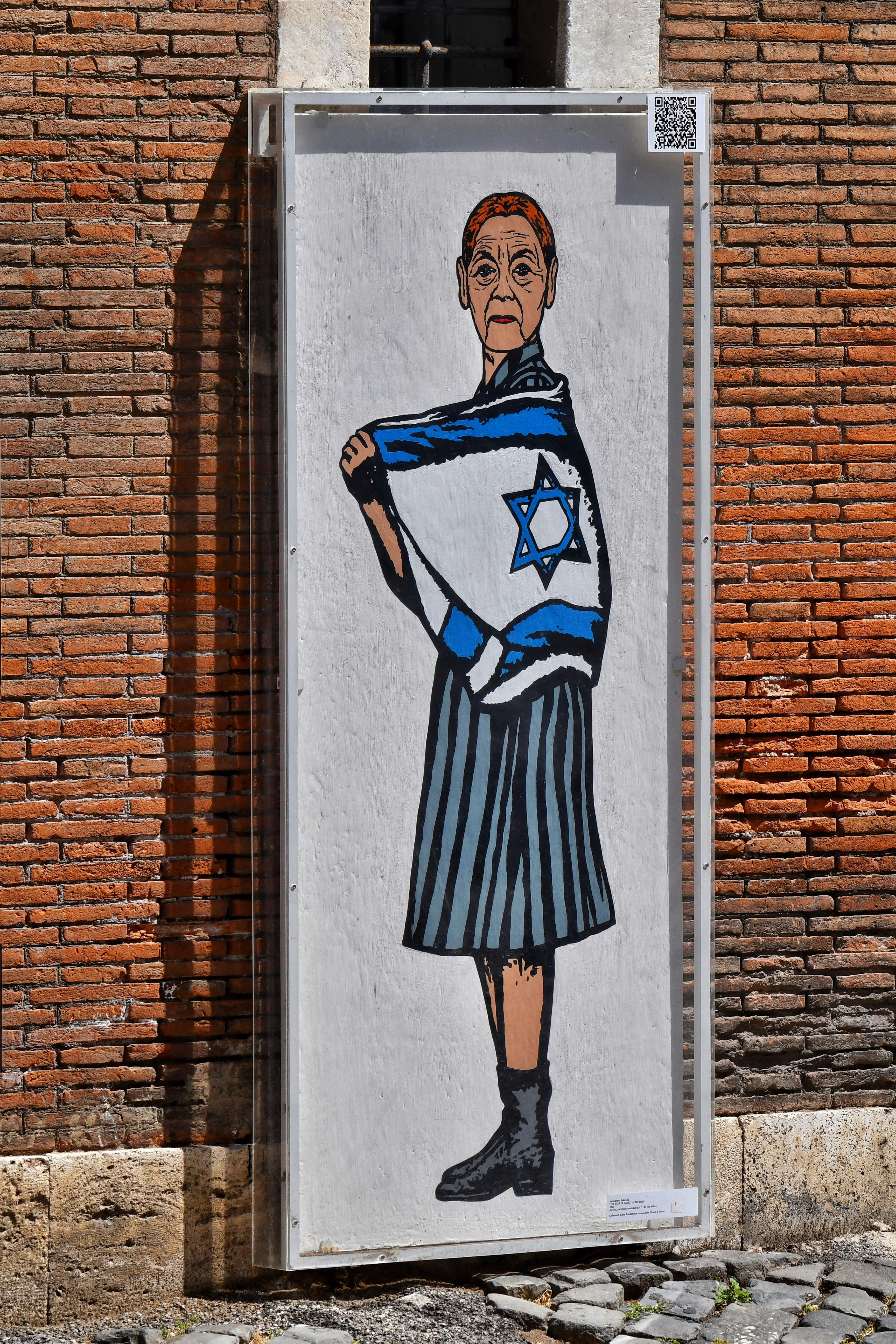 Portrait of Hope: A Street Art Tribute on Brick