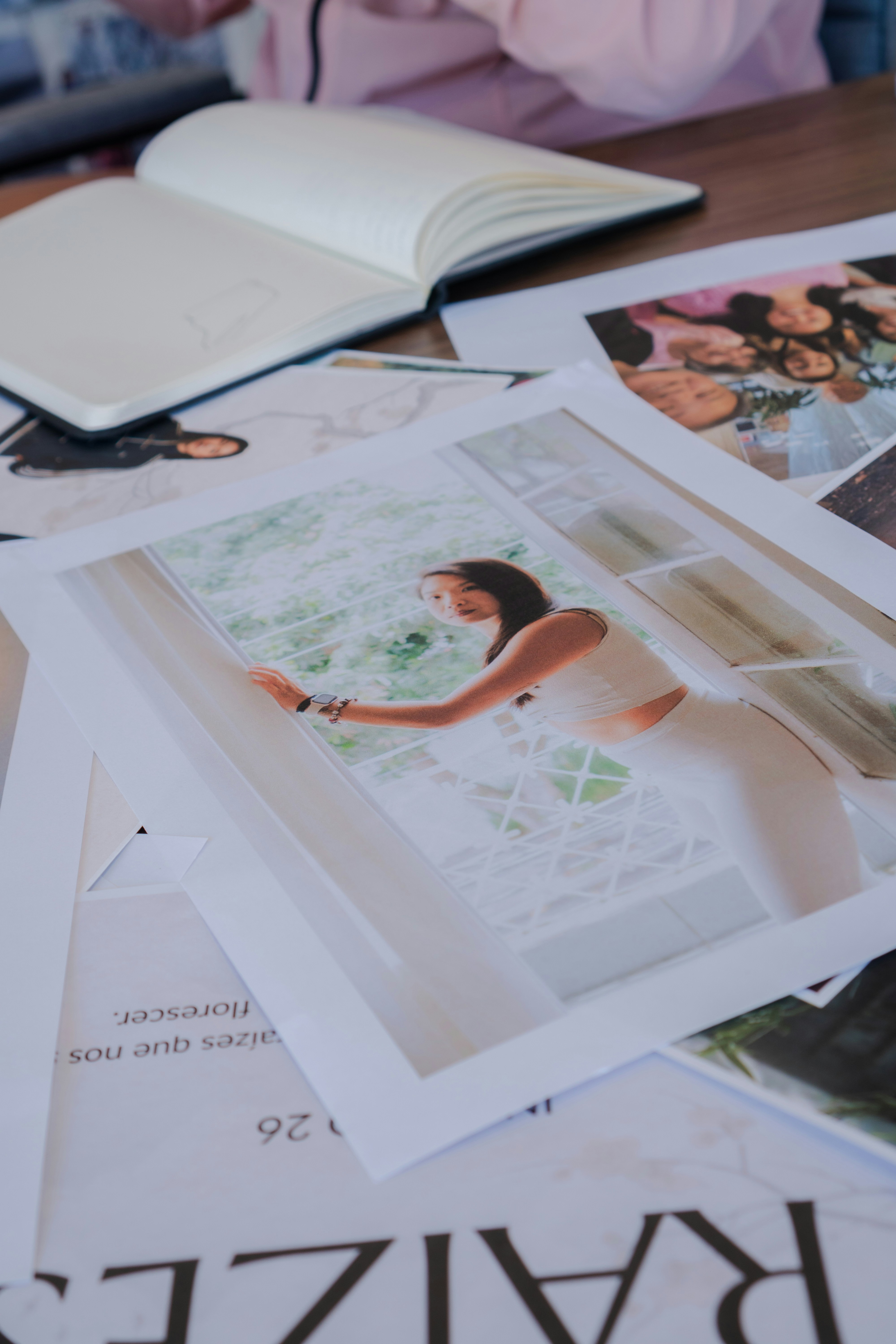 Polaroid Scatter: A Woman in White Among Printed Memories