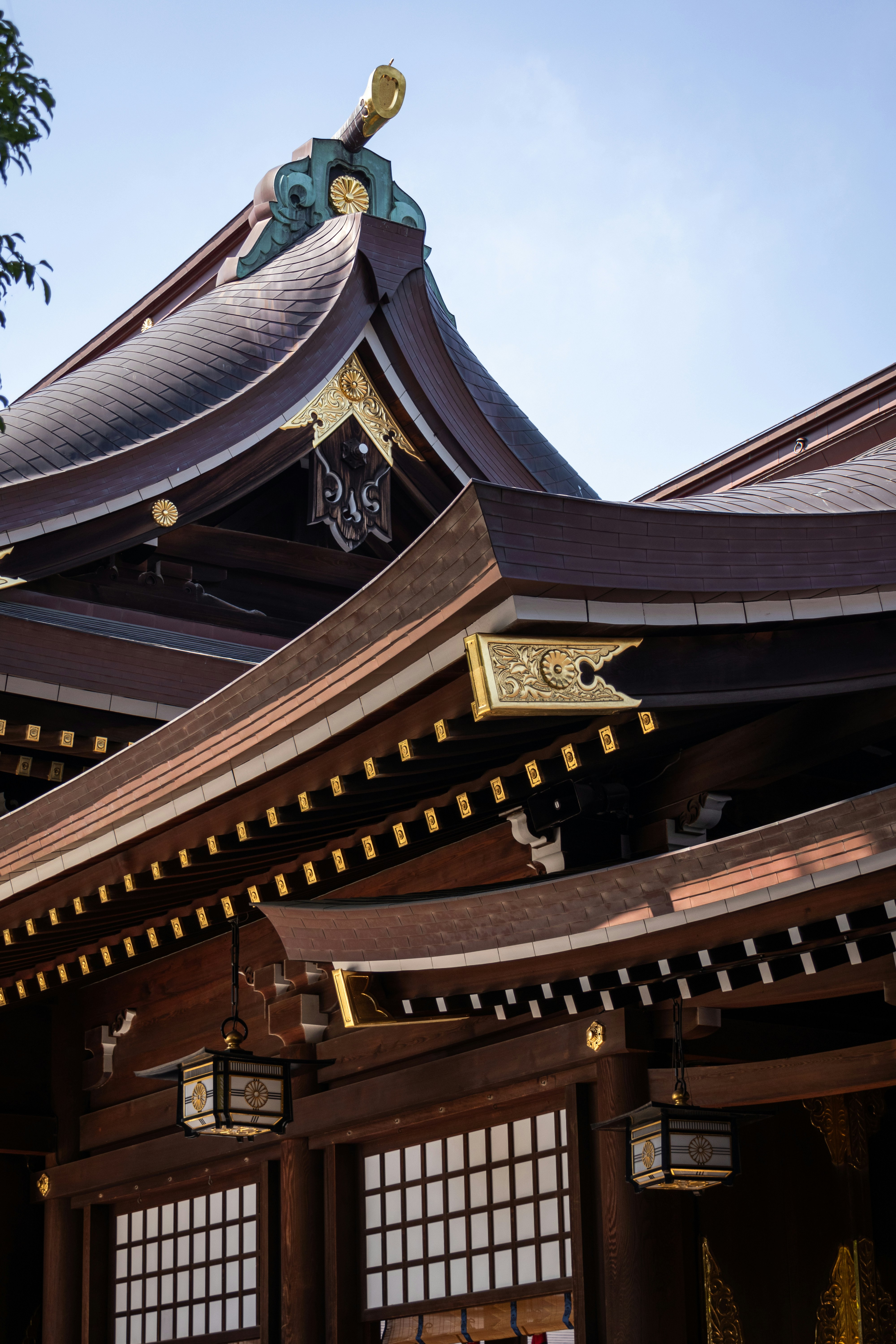 Curved Rooftops and Carved Gold: A Temple's Woodwork in Focus