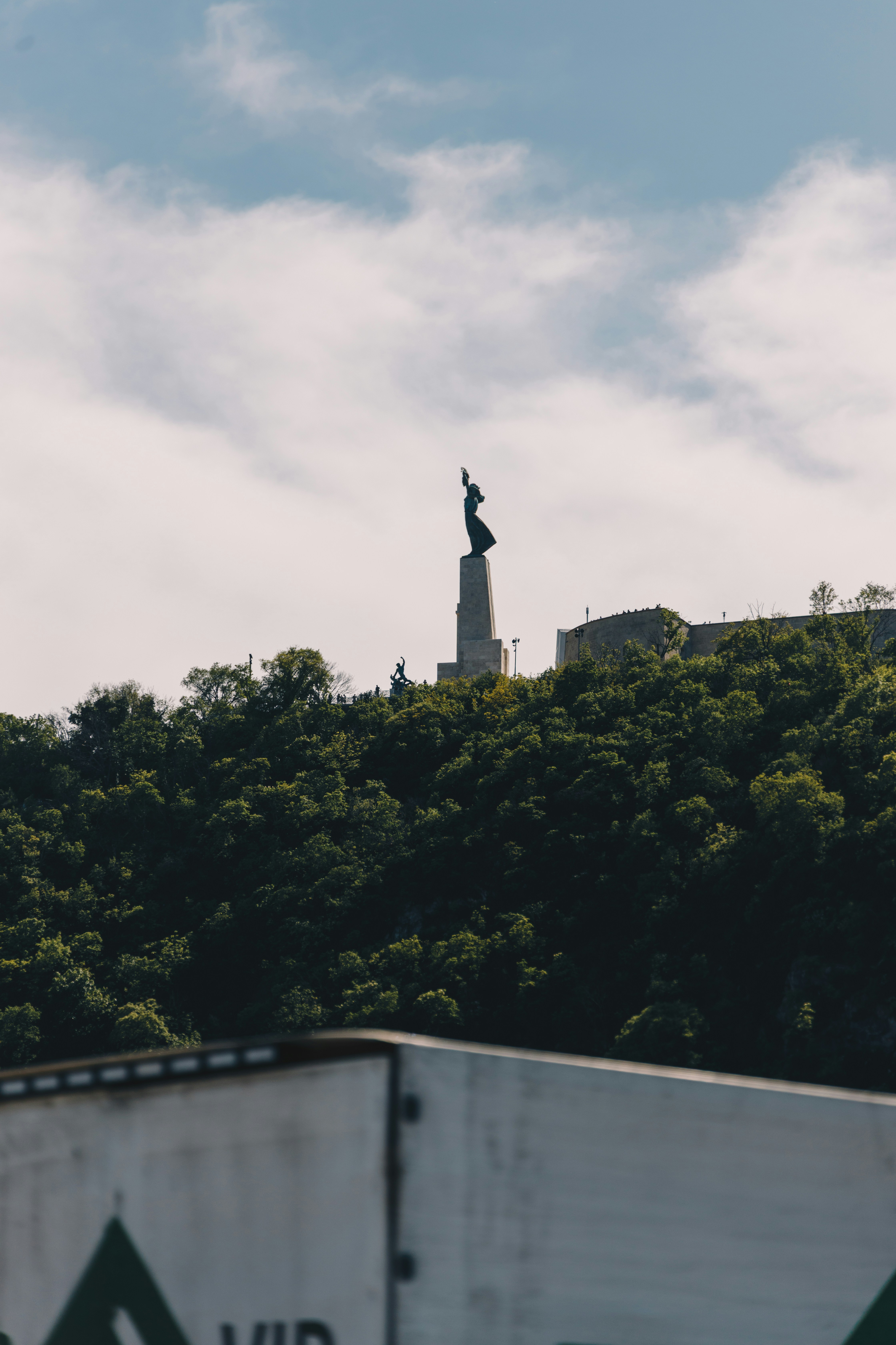 Statue on a hilltop: silhouette against the sky