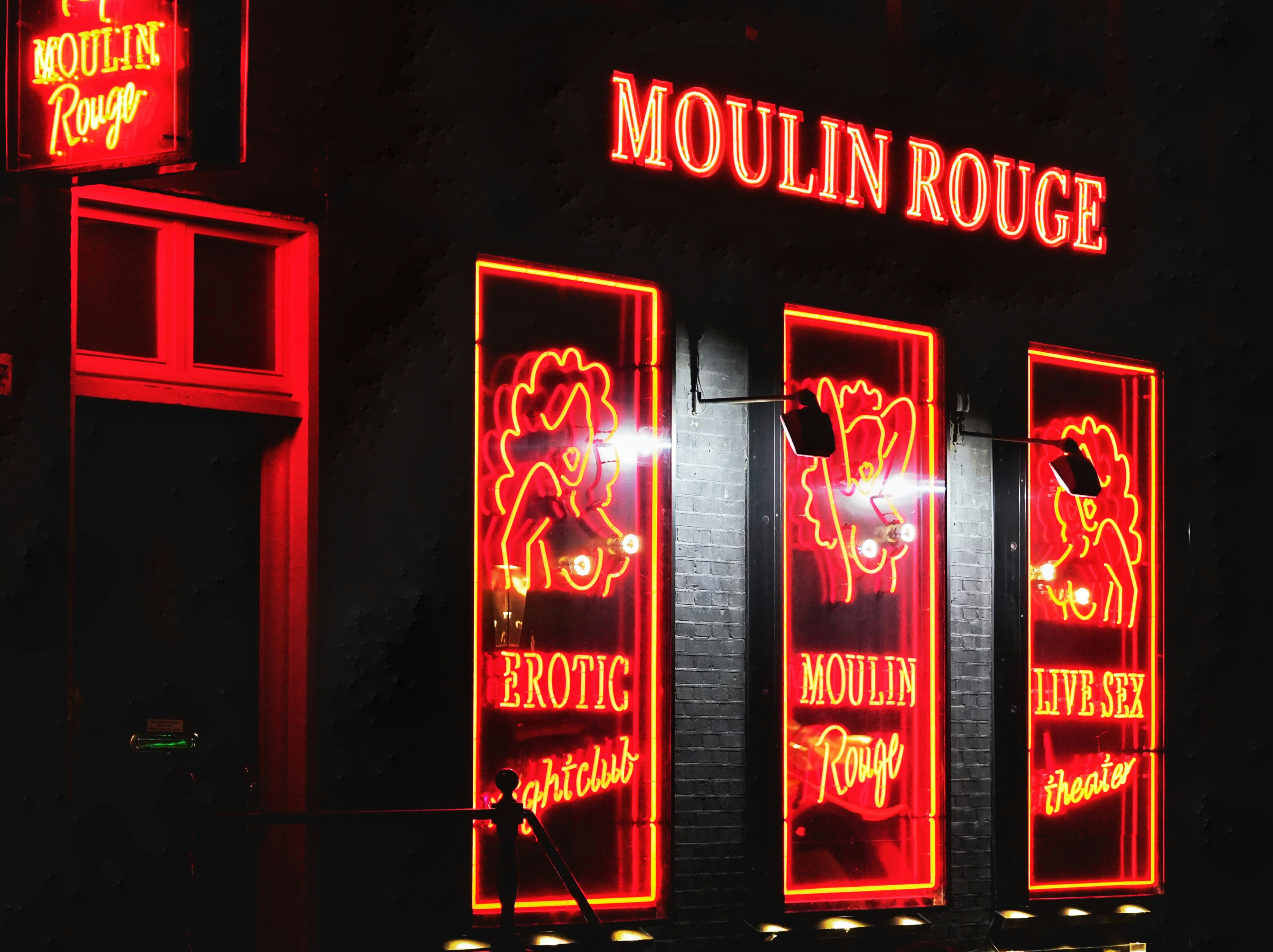 Neon Inferno: Moulin Rouge Facade in Neon Red