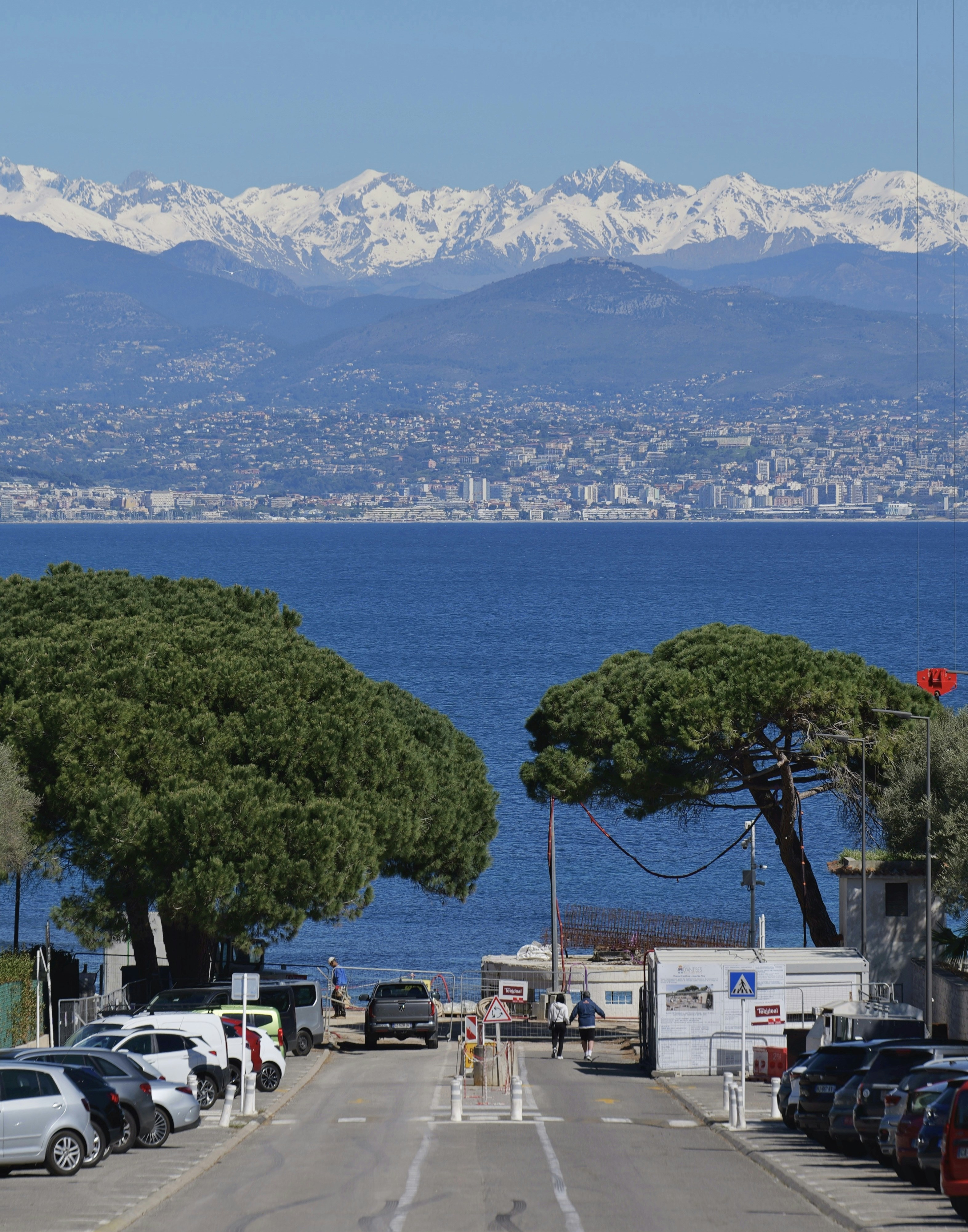 Coastal Boulevard Framing the Snowy Peaks