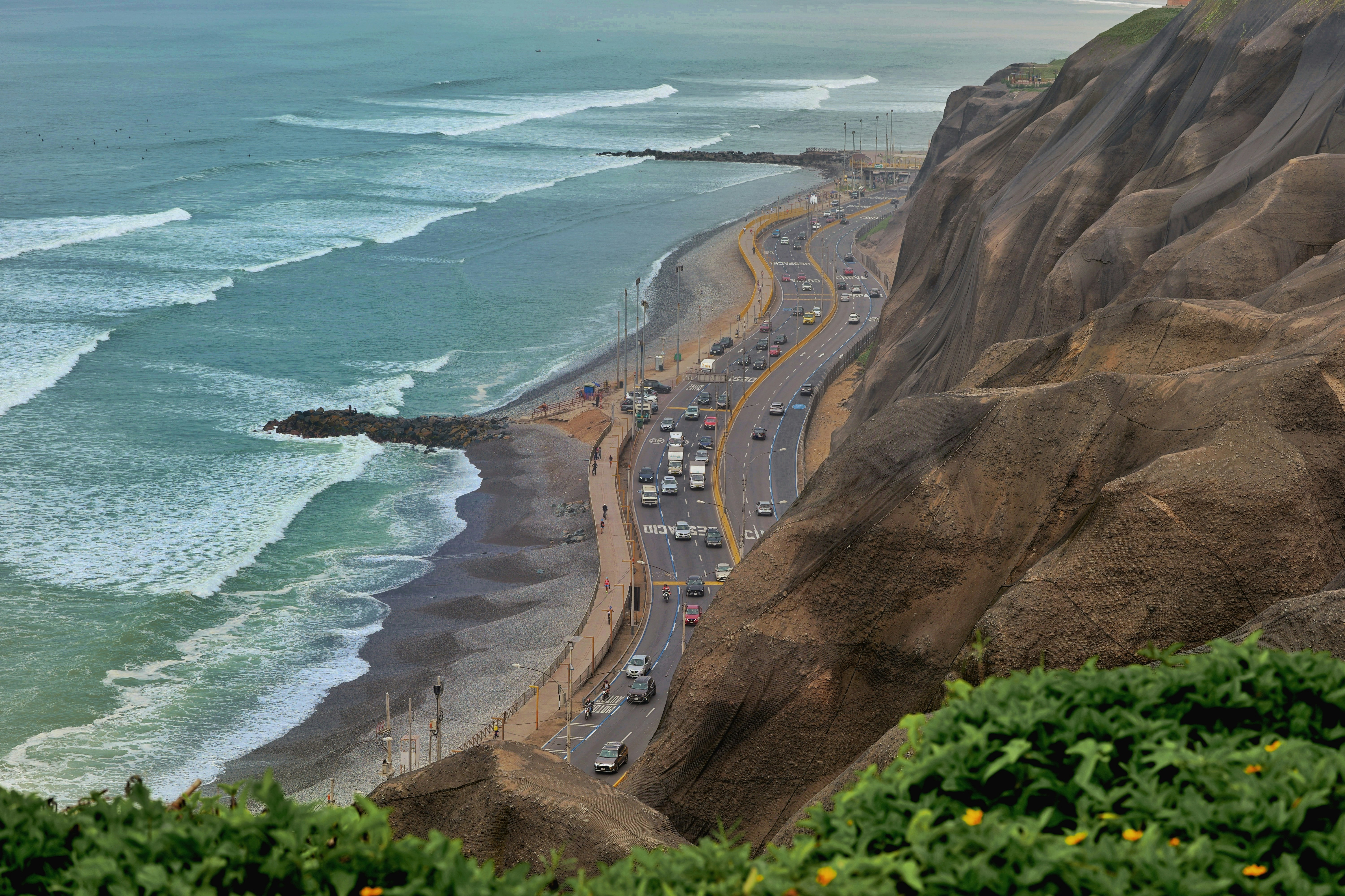 Coastal Highway Carve: A Winding Seaside Route Between Prominent Cliffs