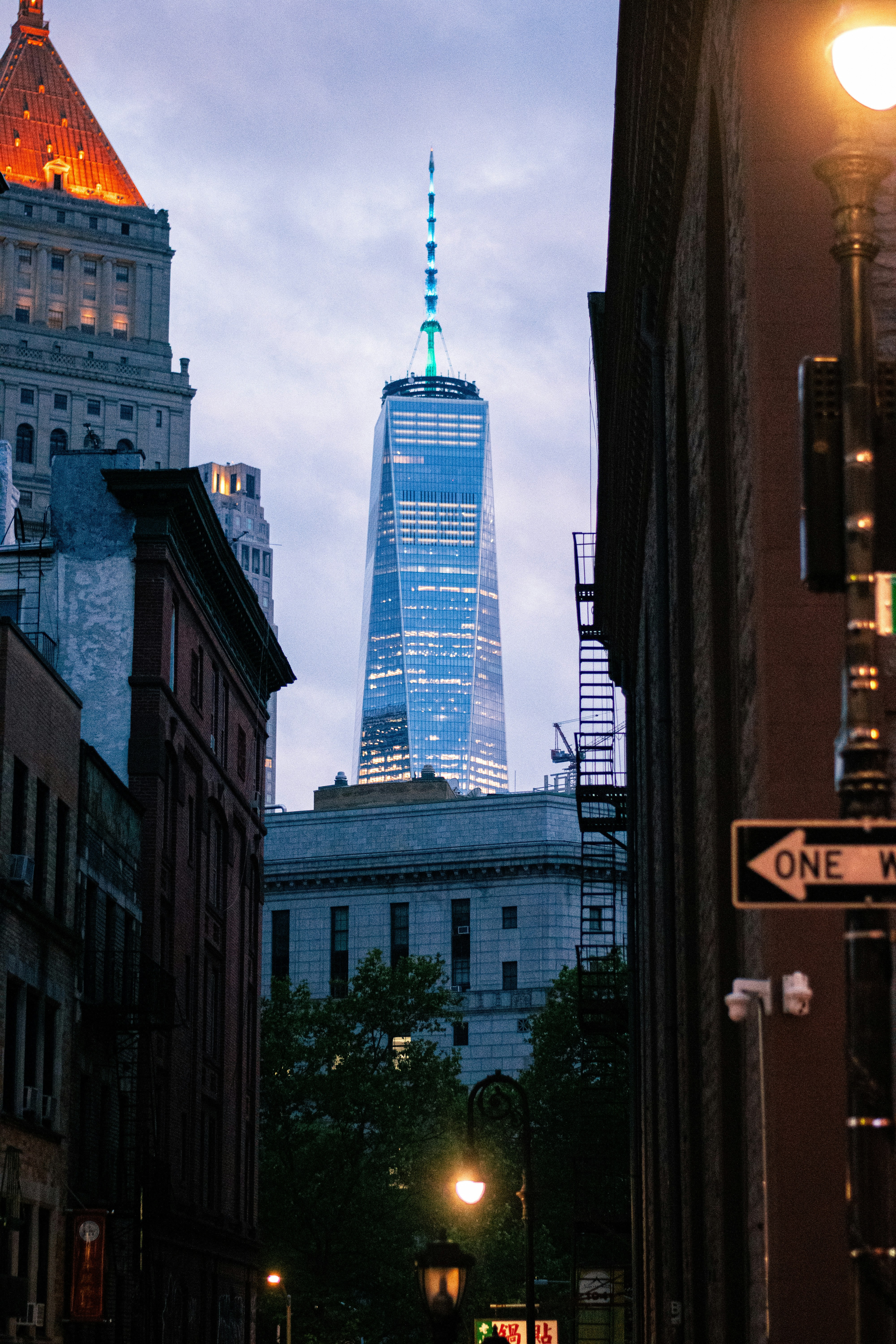Distant Spire over a City Canyon