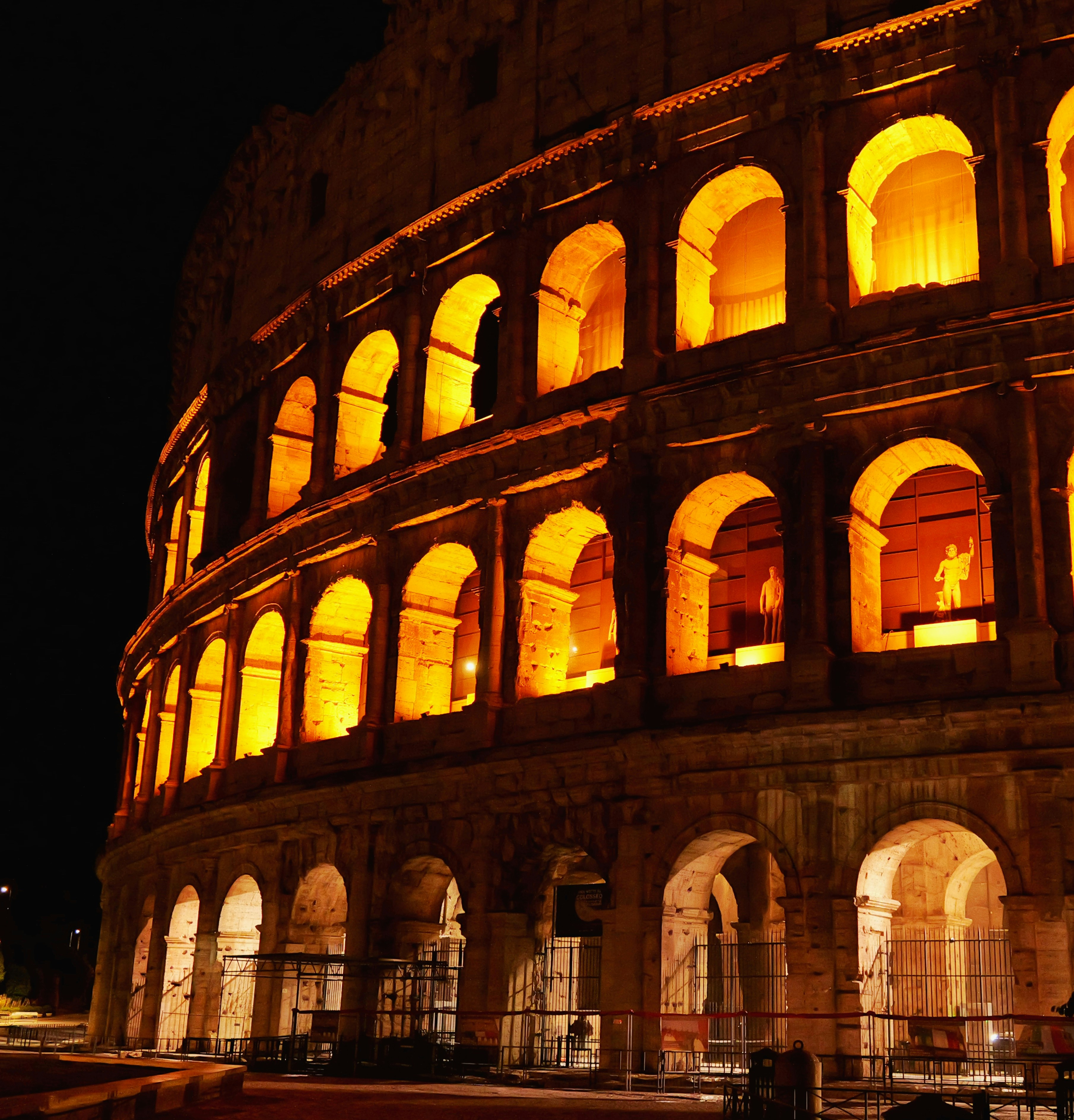 Golden Arches: Night Illumination on the Colosseum
