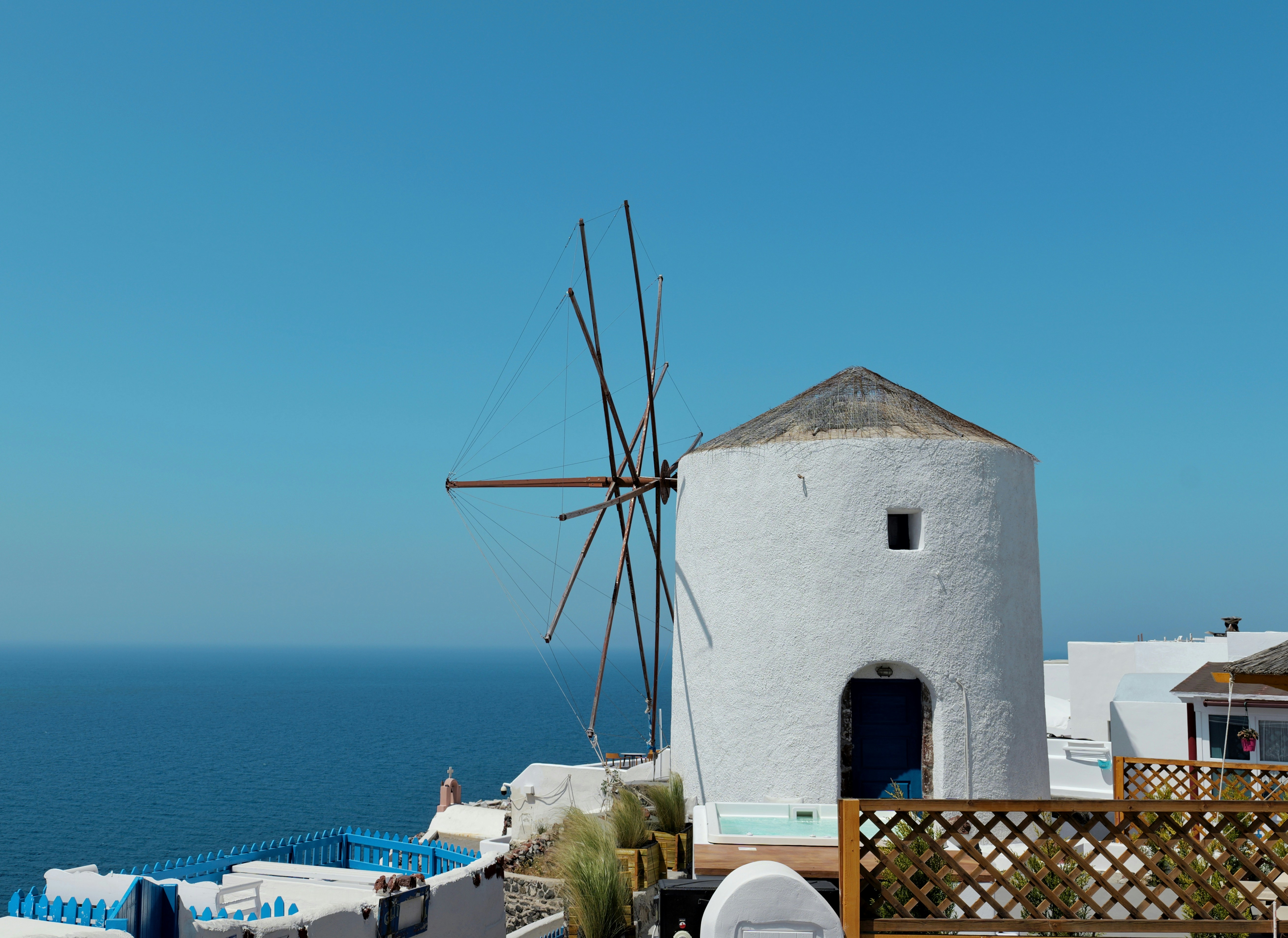 Windmill on the Aegean Cliffs