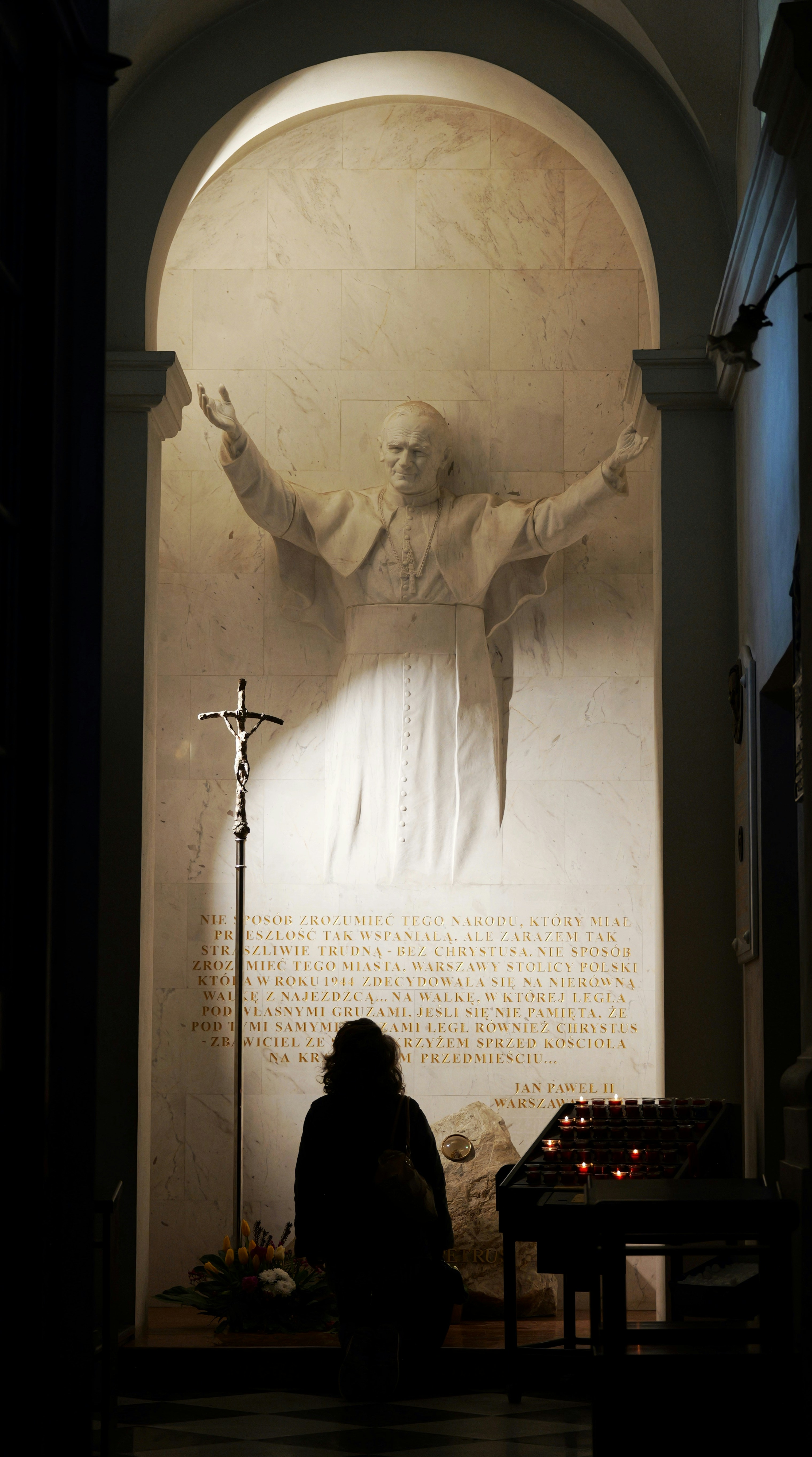 Ascendant Arch: A Solemn Clerical Figure in Marble Arch