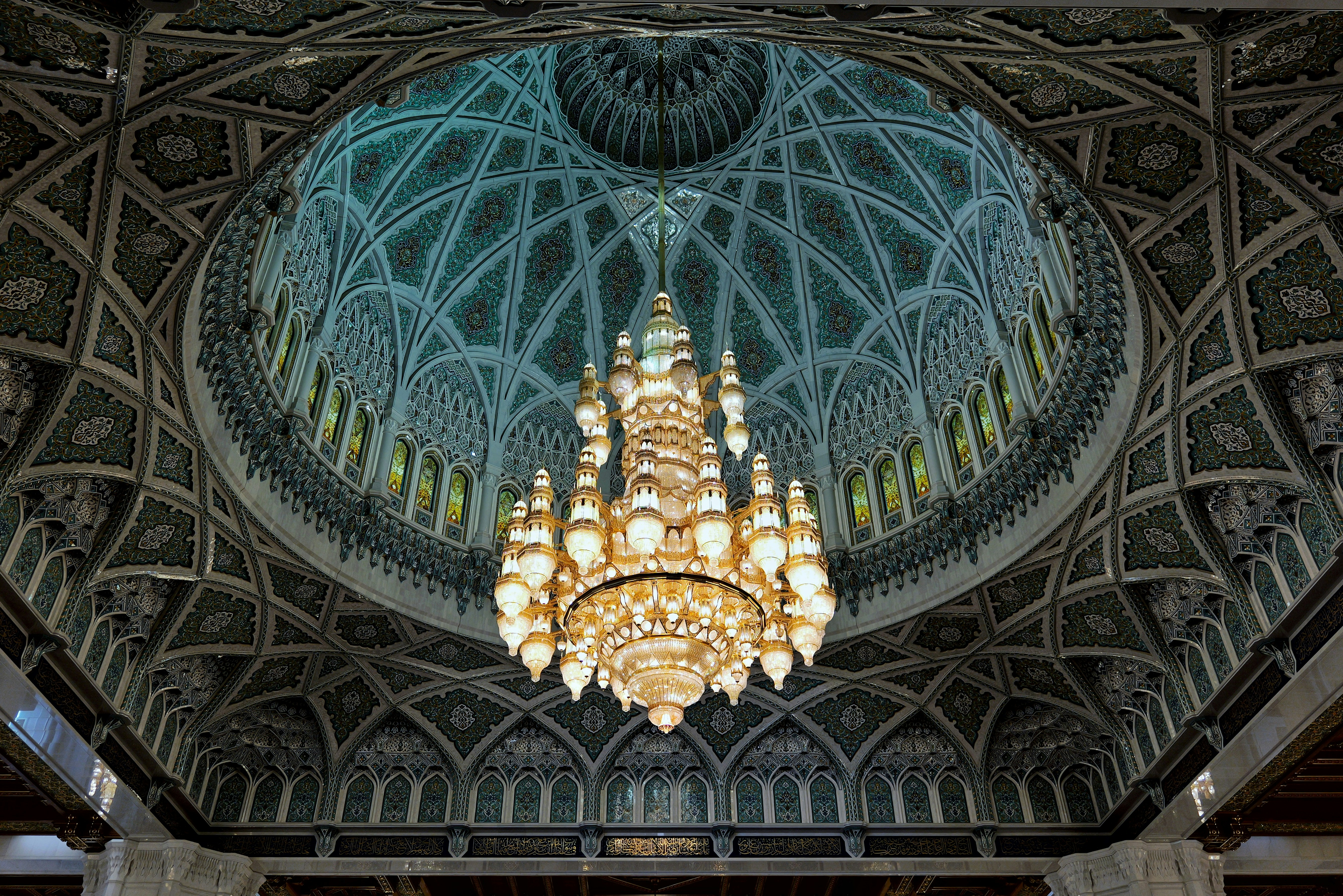 Crystal Constellation: An Ornate Dome Framed by a Grand Chandelier