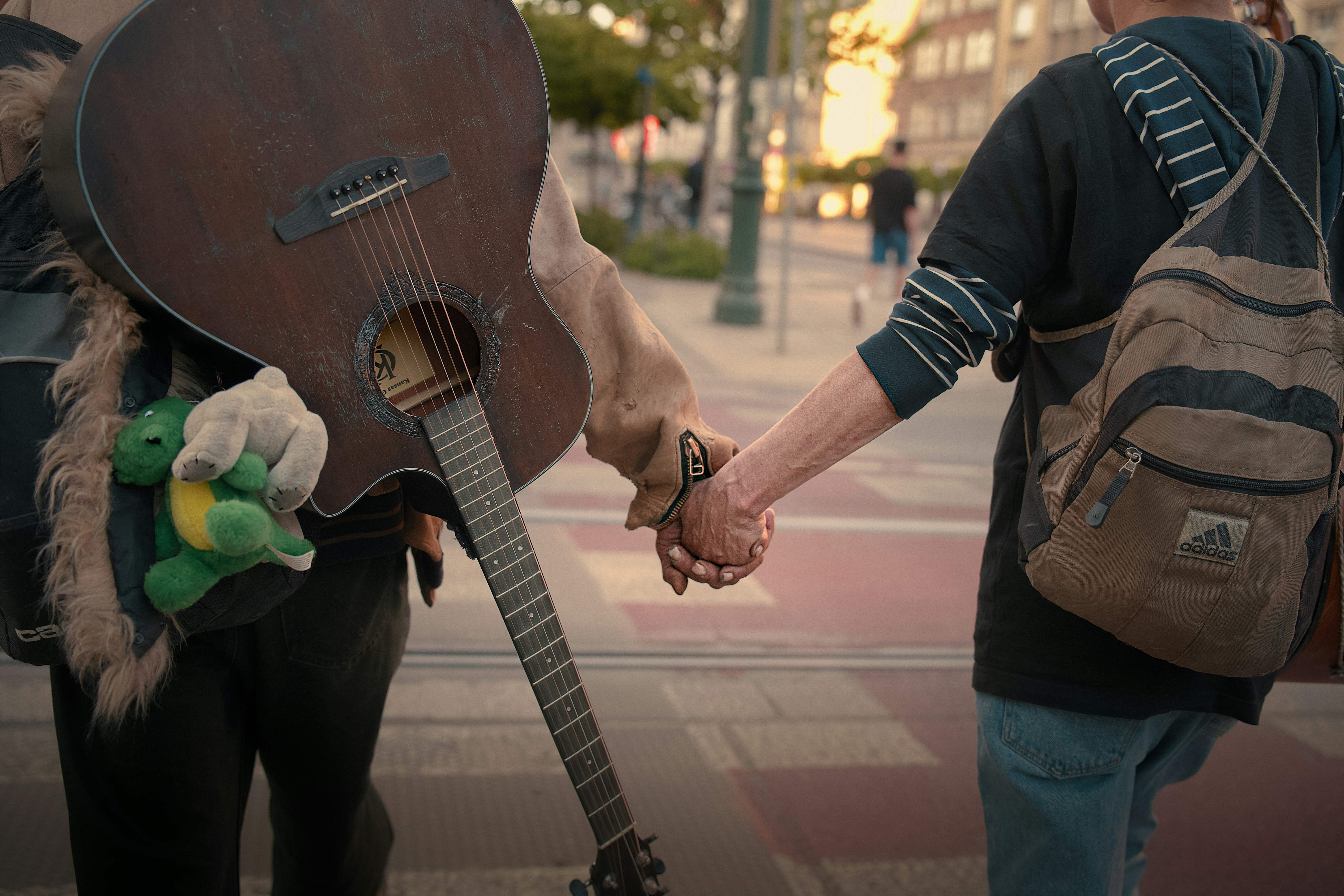 Hands in Harmony: A Street Moment of Trust Between Strangers
